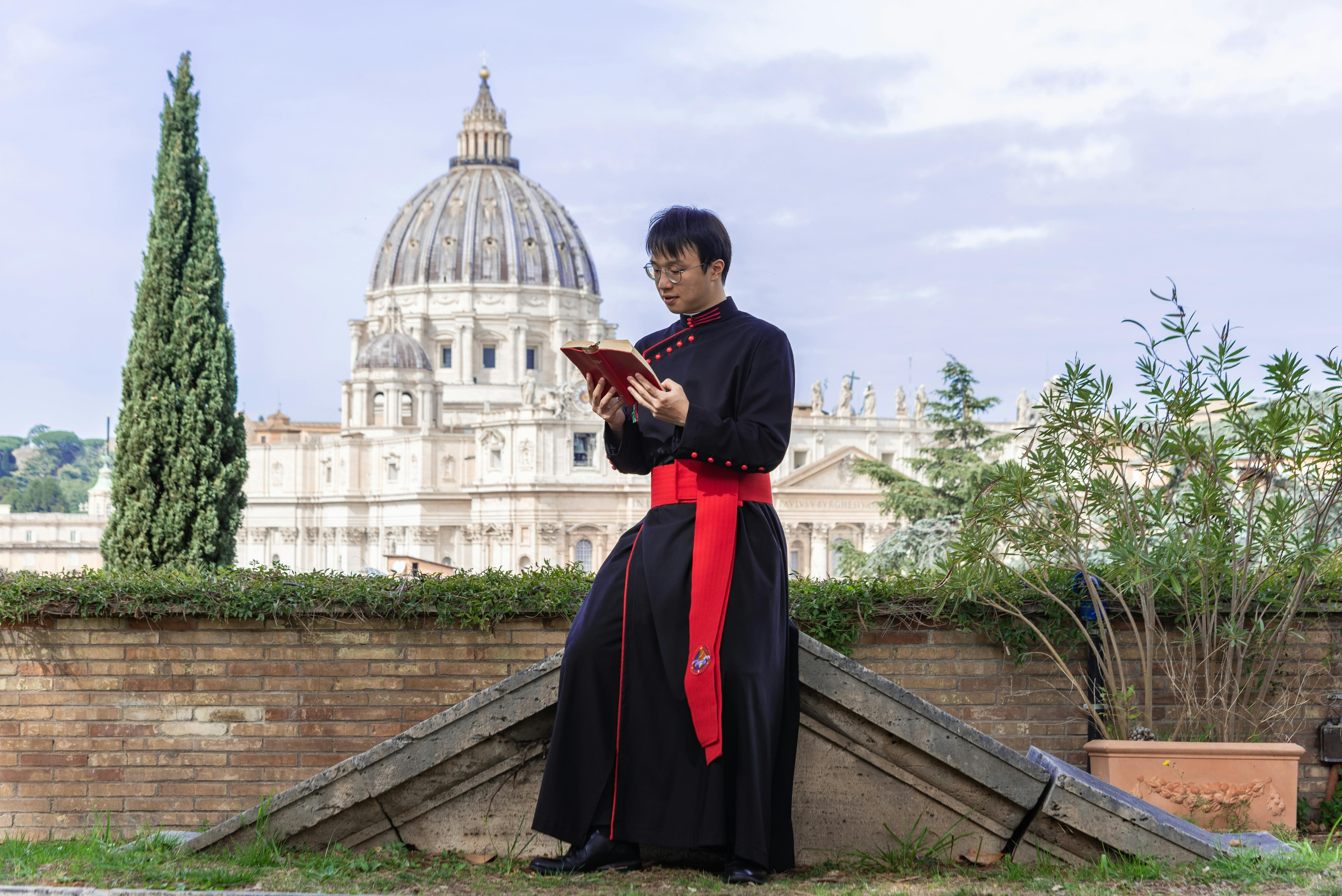 Priest Reading in Vatican City Garden · Free Stock Photo