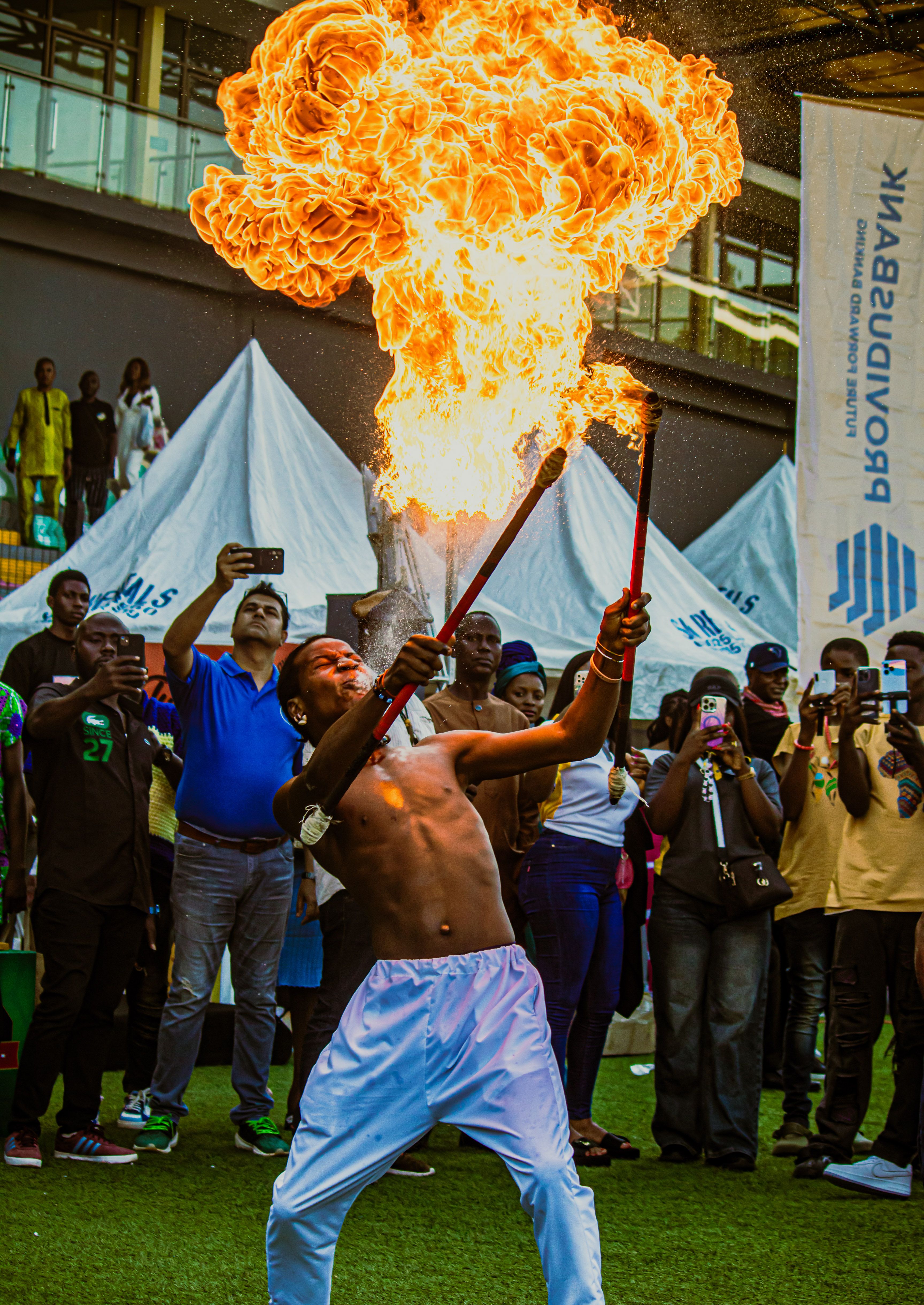 Fire Performer Entertaining Crowd in Lagos · Free Stock Photo