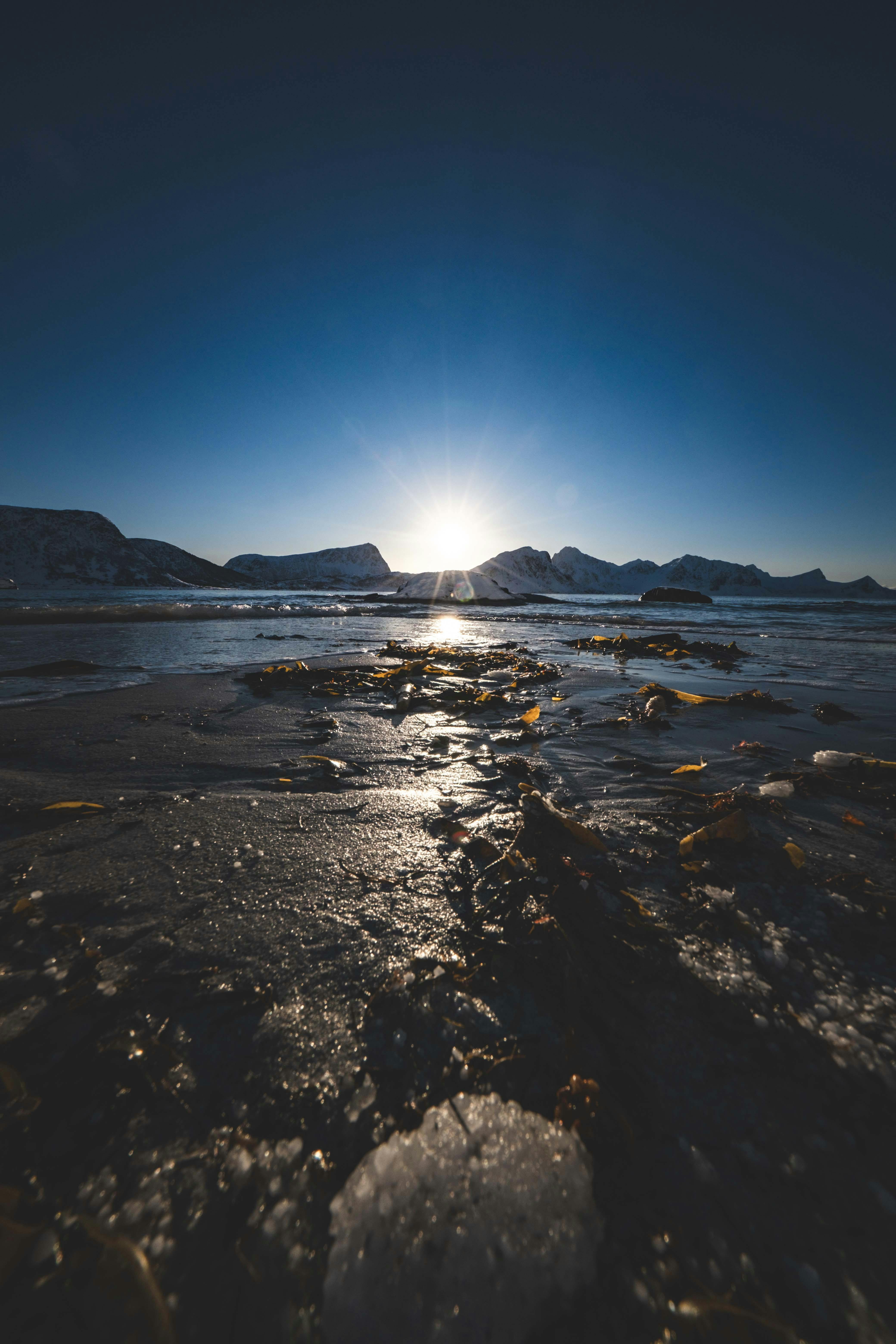 Stunning Sunrise Over Icy Mountain Landscape · Free Stock Photo