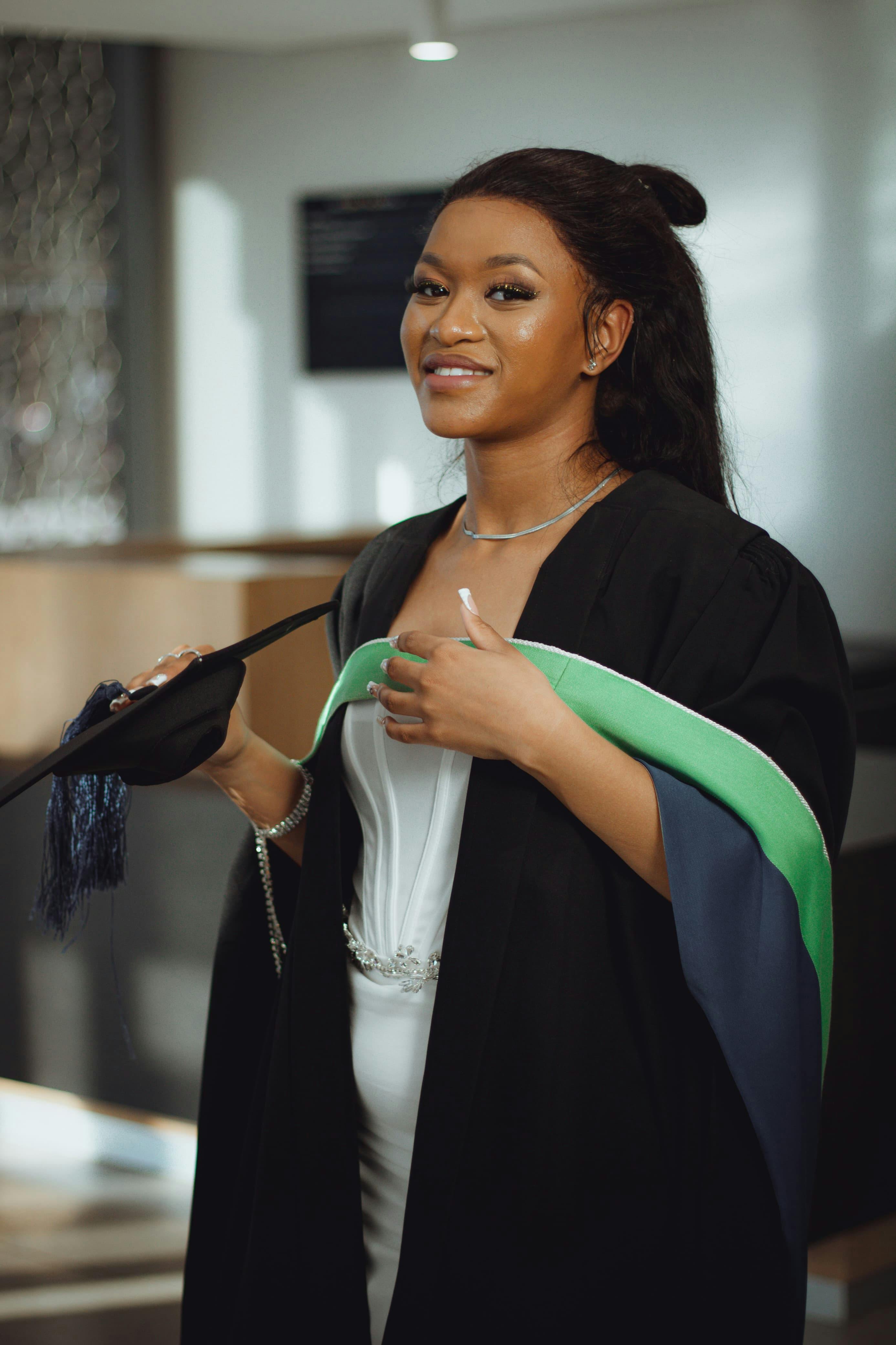 Young Woman Celebrating Graduation Accomplishment · Free Stock Photo