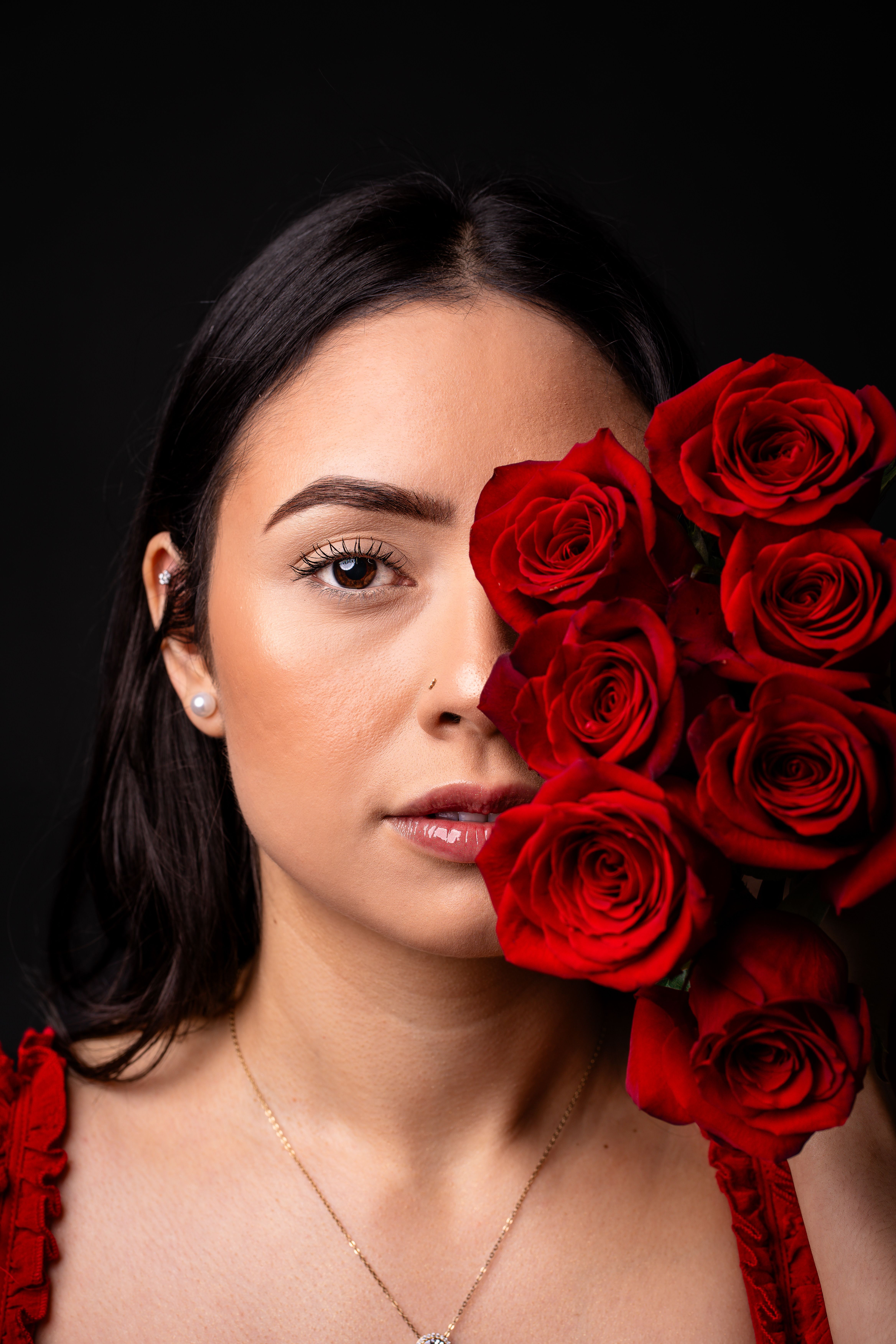 Portrait of Woman with Red Roses in Artistic Style · Free Stock Photo