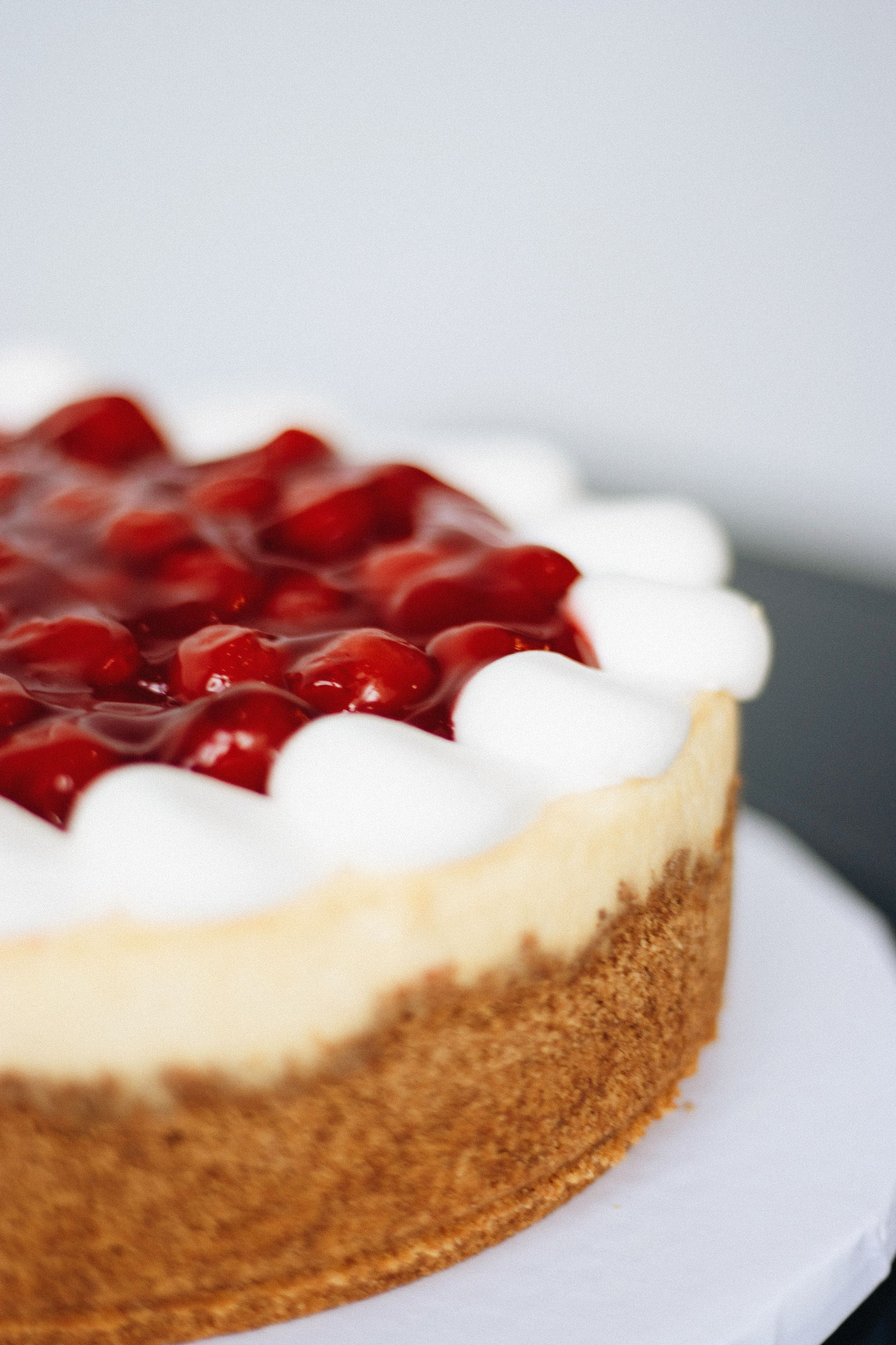 Artisan Cherry Cheesecake with Whipped Topping · Free Stock Photo