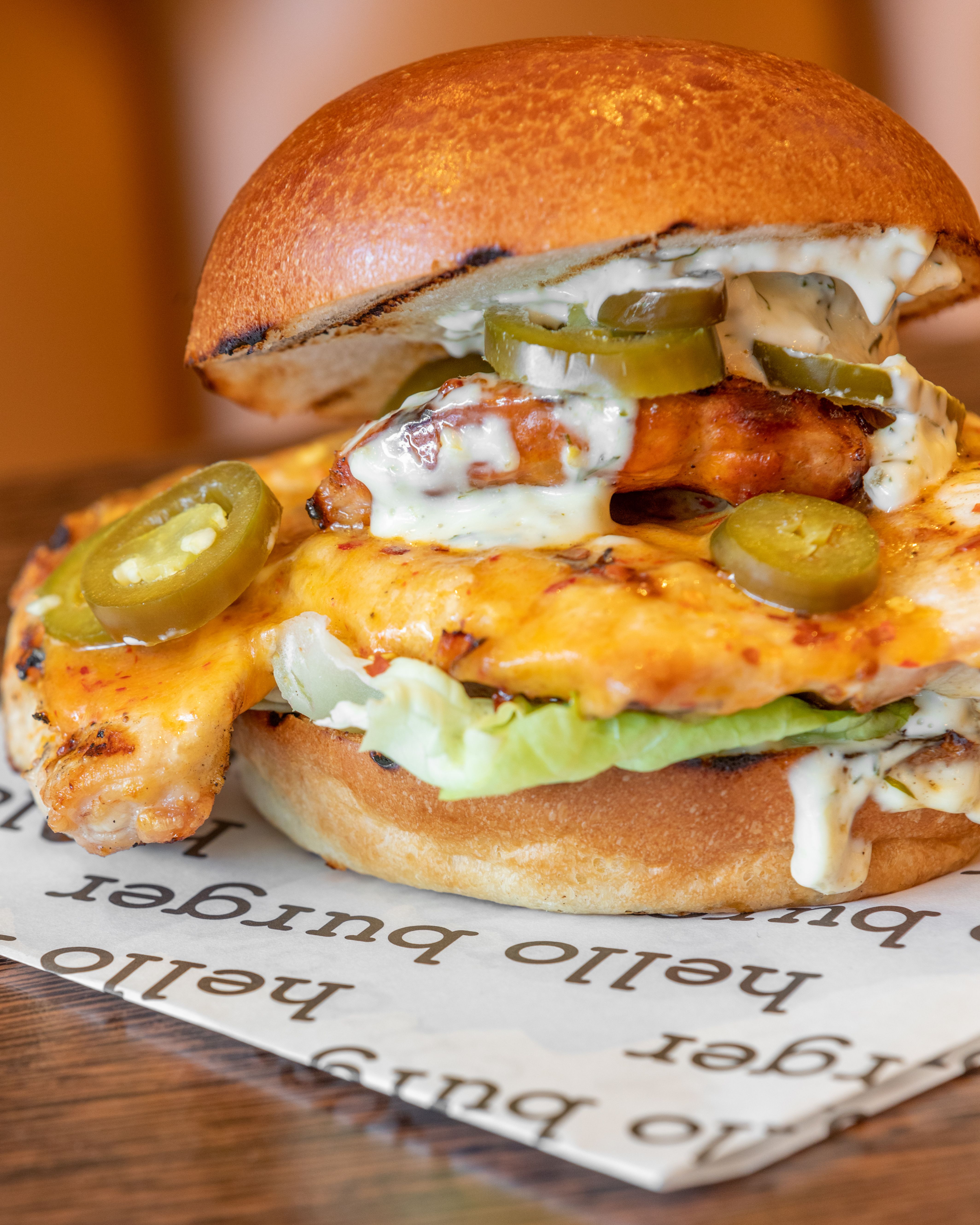 Delicious Spicy Grilled Chicken Burger with Jalapenos · Free Stock Photo
