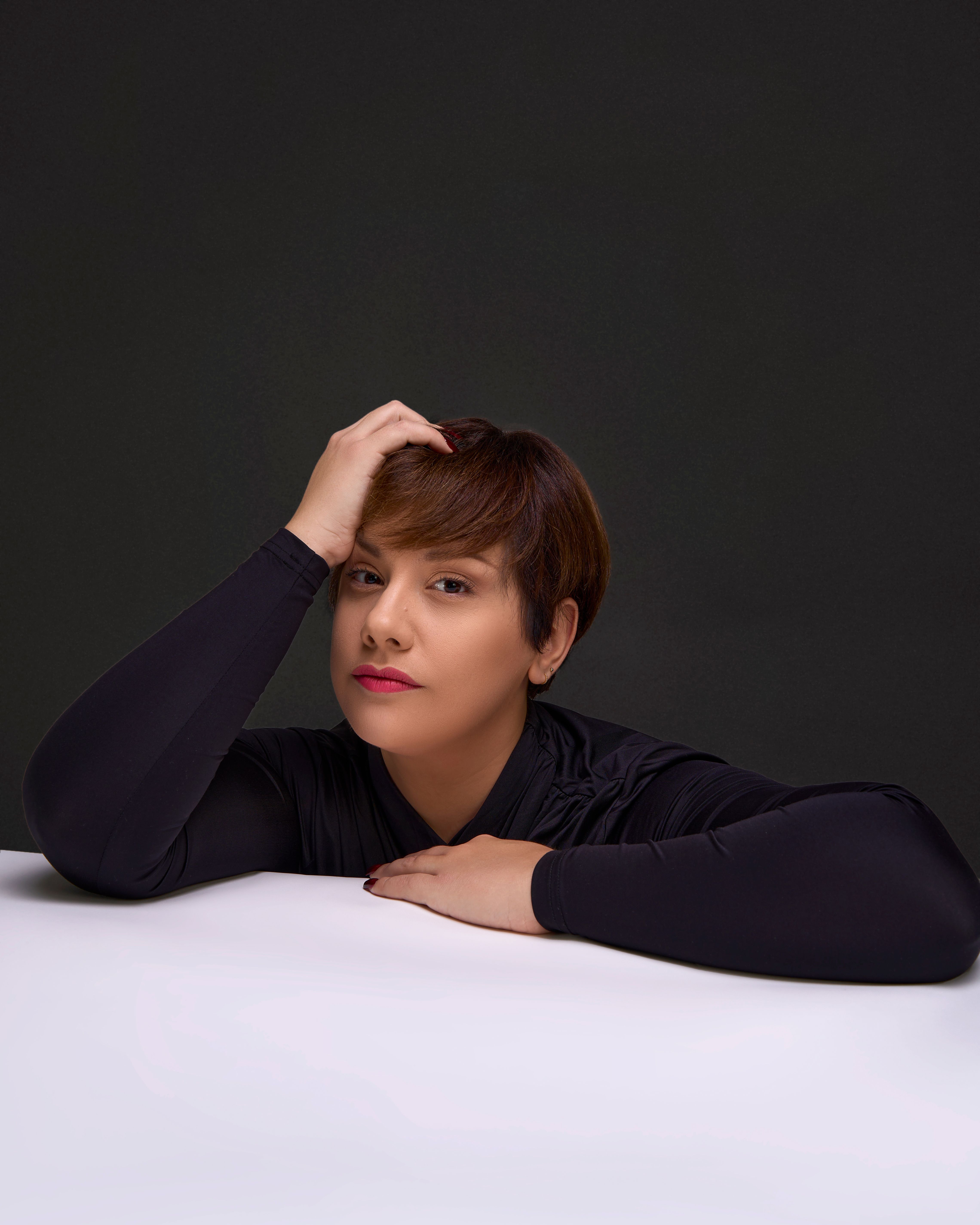 Elegant Studio Portrait of Woman with Short Hair · Free Stock Photo