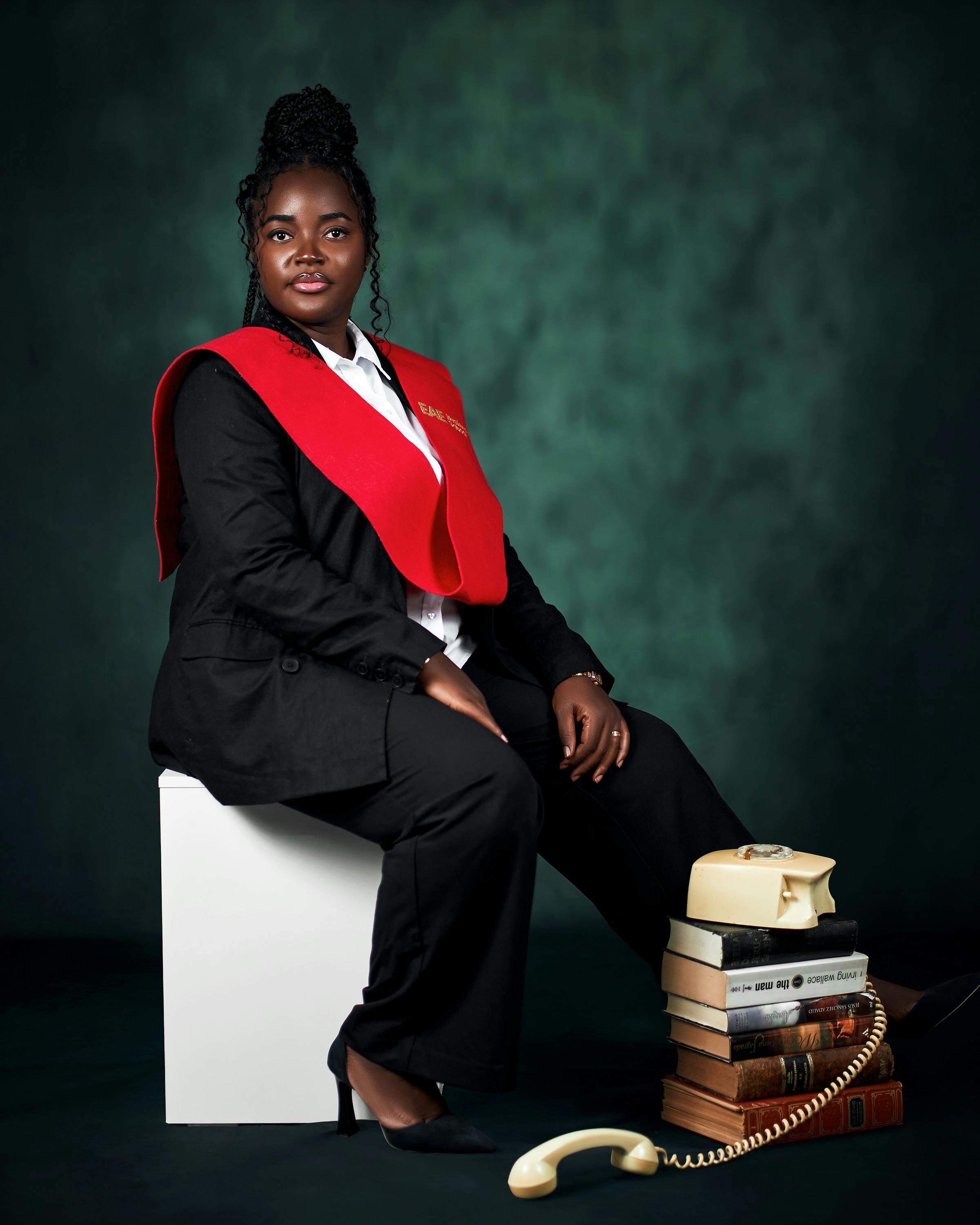 Confident Graduate in Academic Attire Portrait · Free Stock Photo