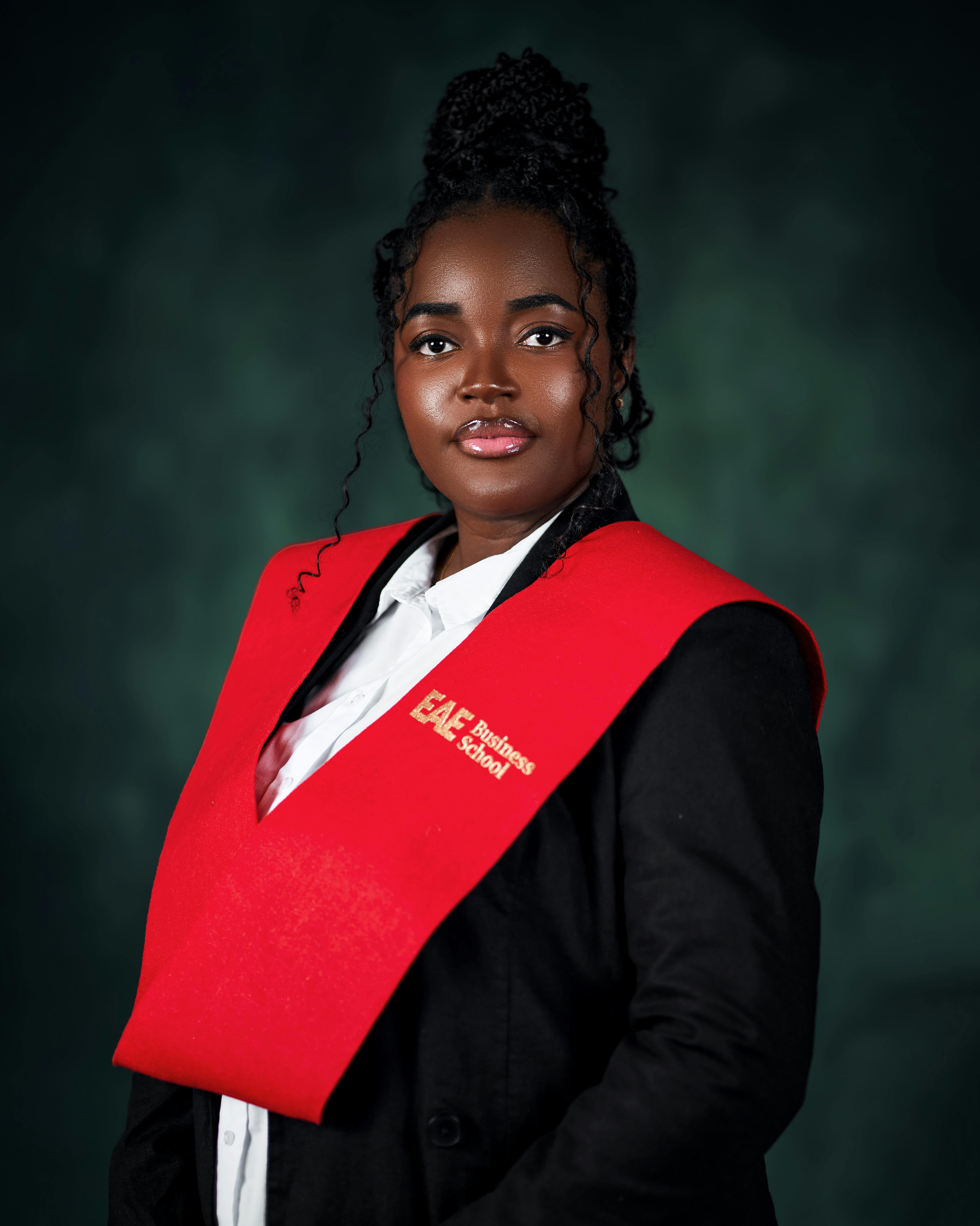 Portrait of a Graduate in Formal Attire · Free Stock Photo