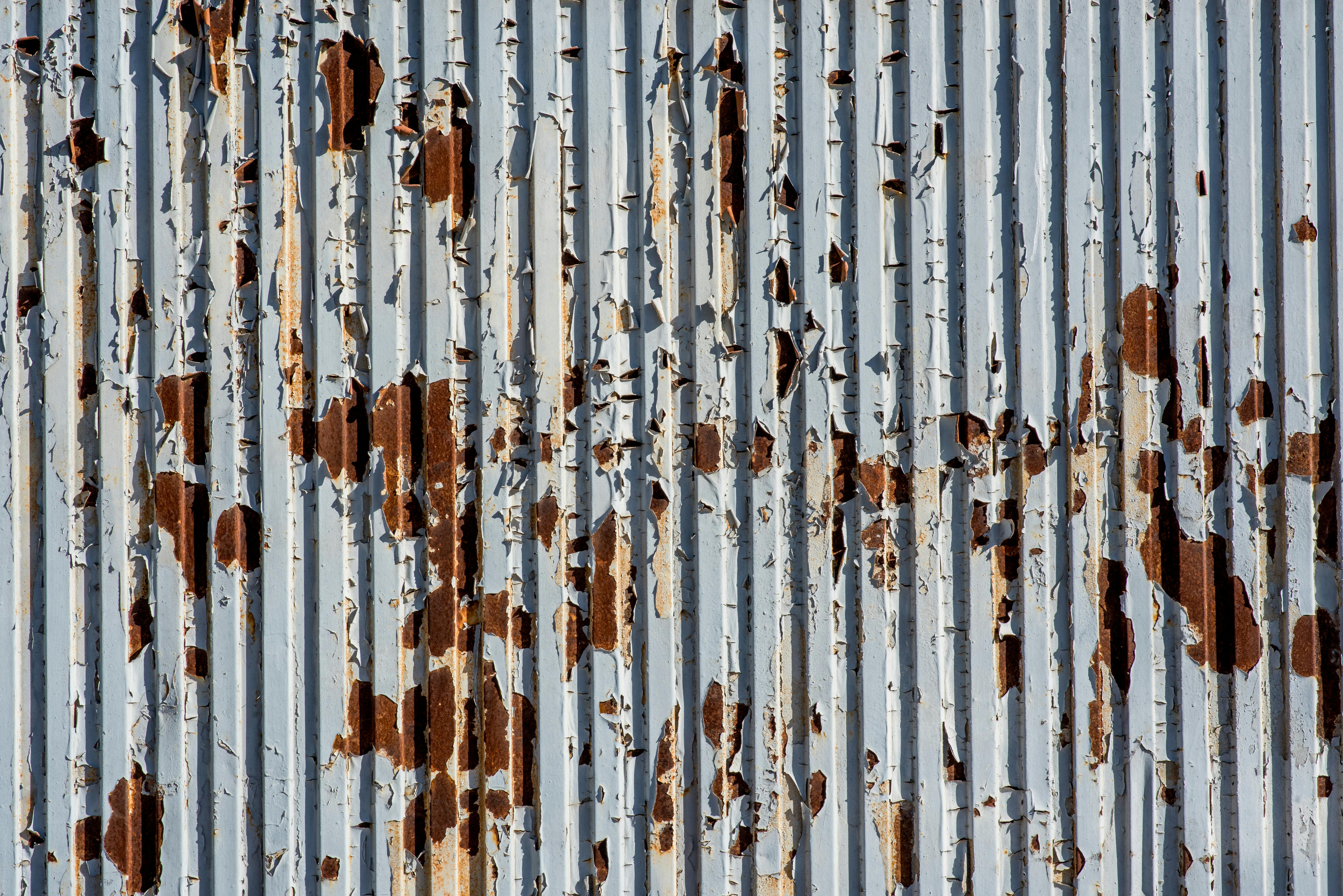 Weathered Corrugated Metal with Rust Patterns · Free Stock Photo