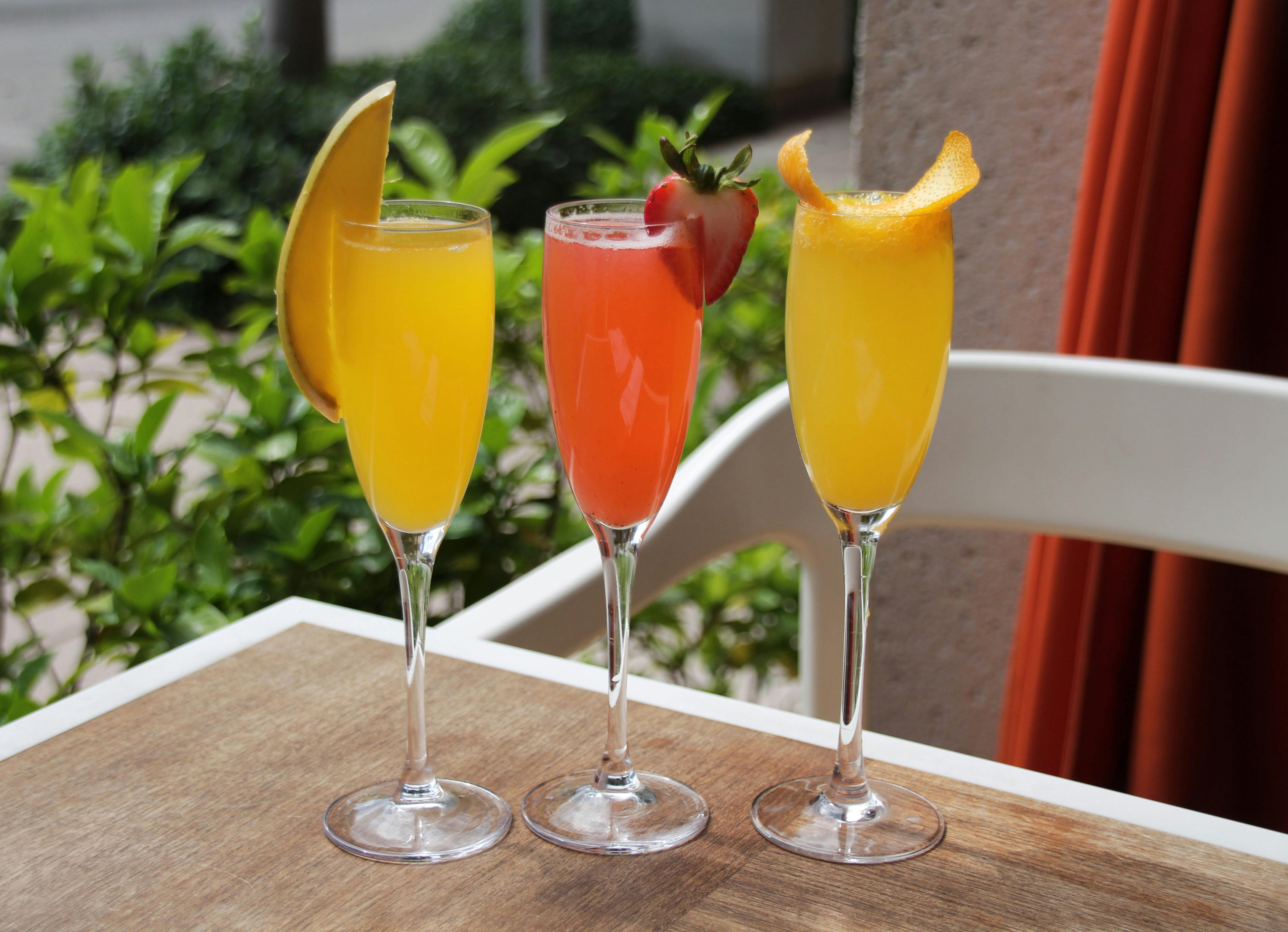 Refreshing Fruit Mimosas Display Outdoors · Free Stock Photo