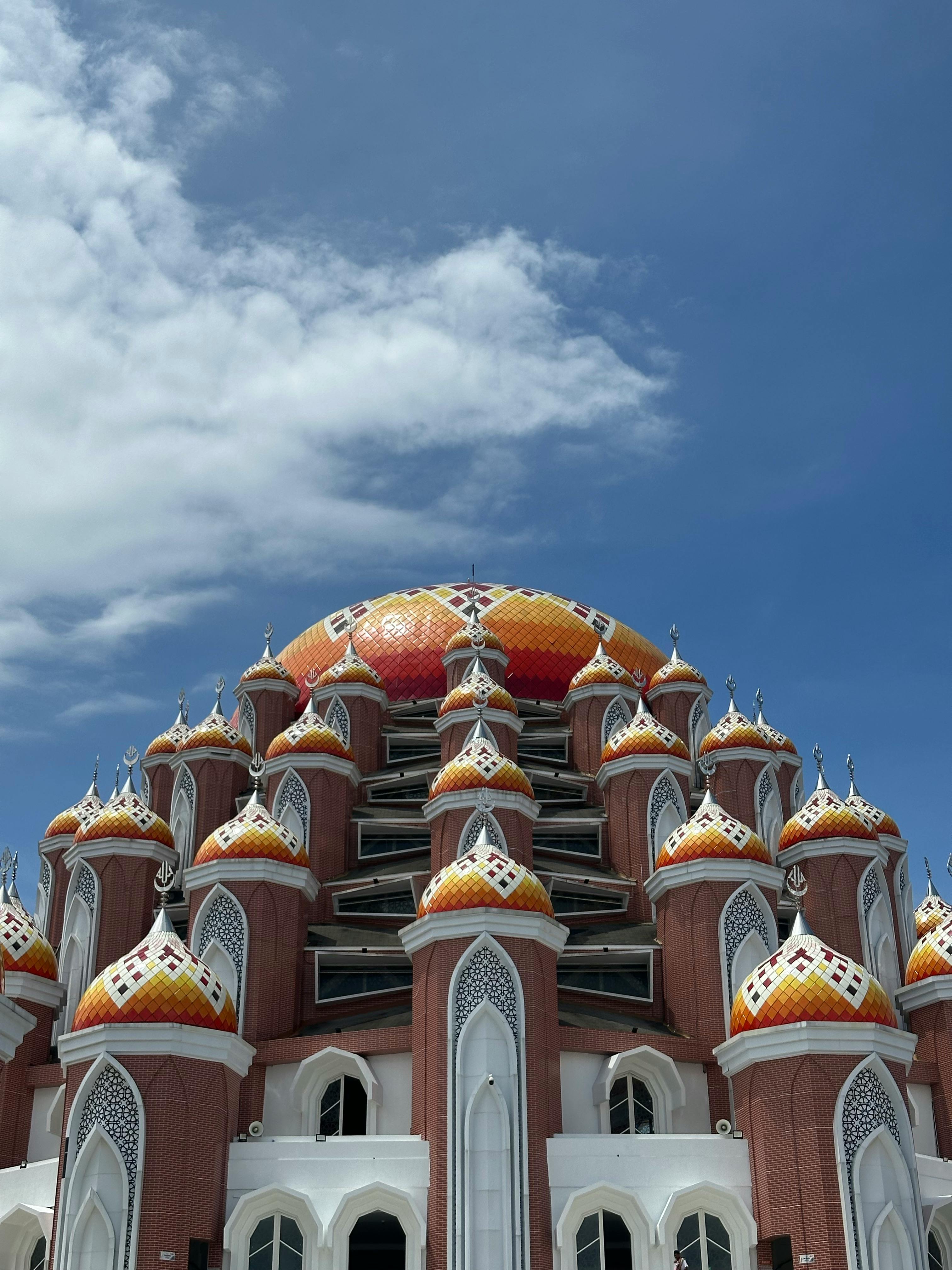 Stunning Islamic Architecture Under Blue Sky · Free Stock Photo