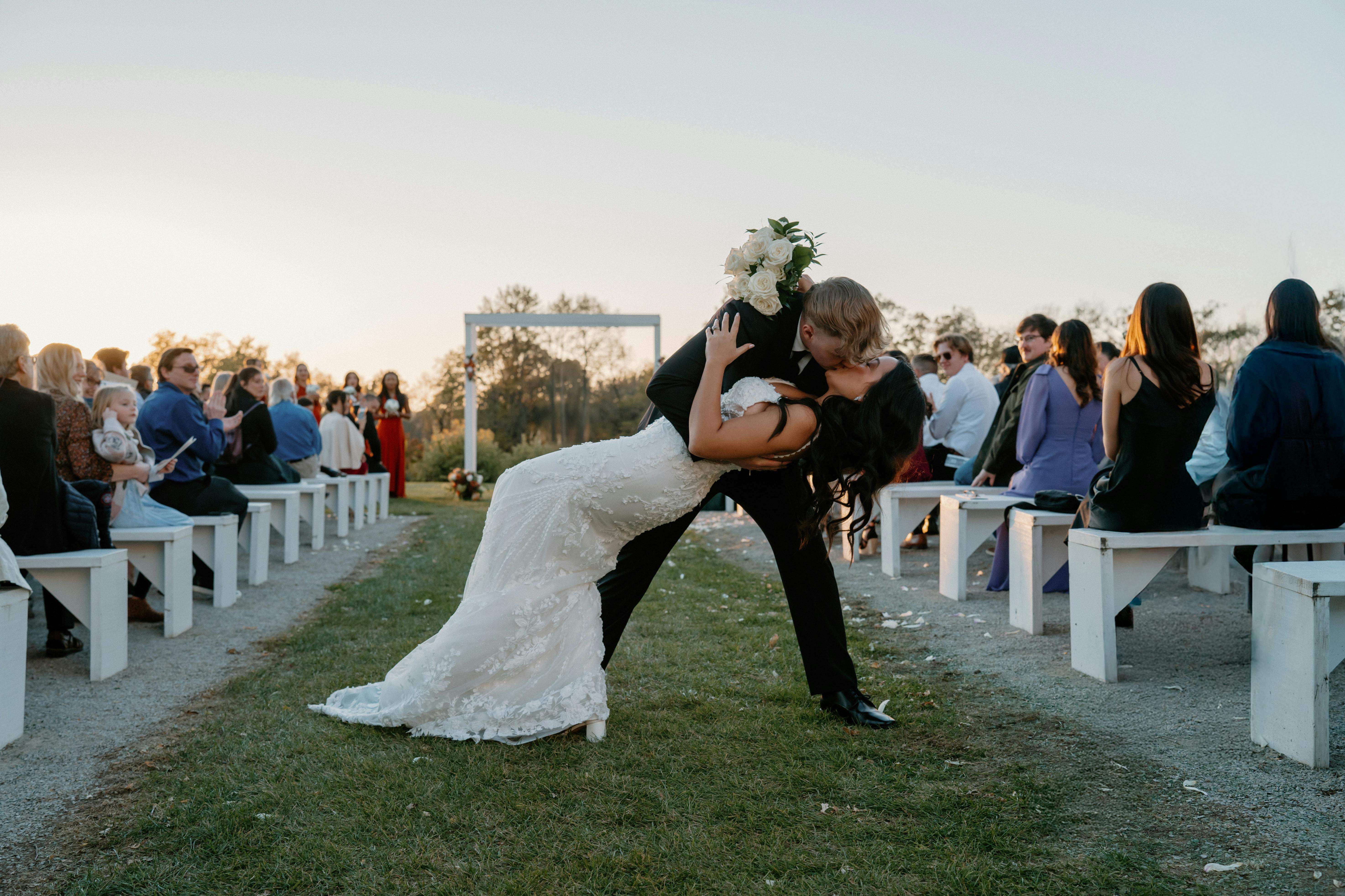 Elegant Outdoor Wedding Couple Dance at Sunset · Free Stock Photo