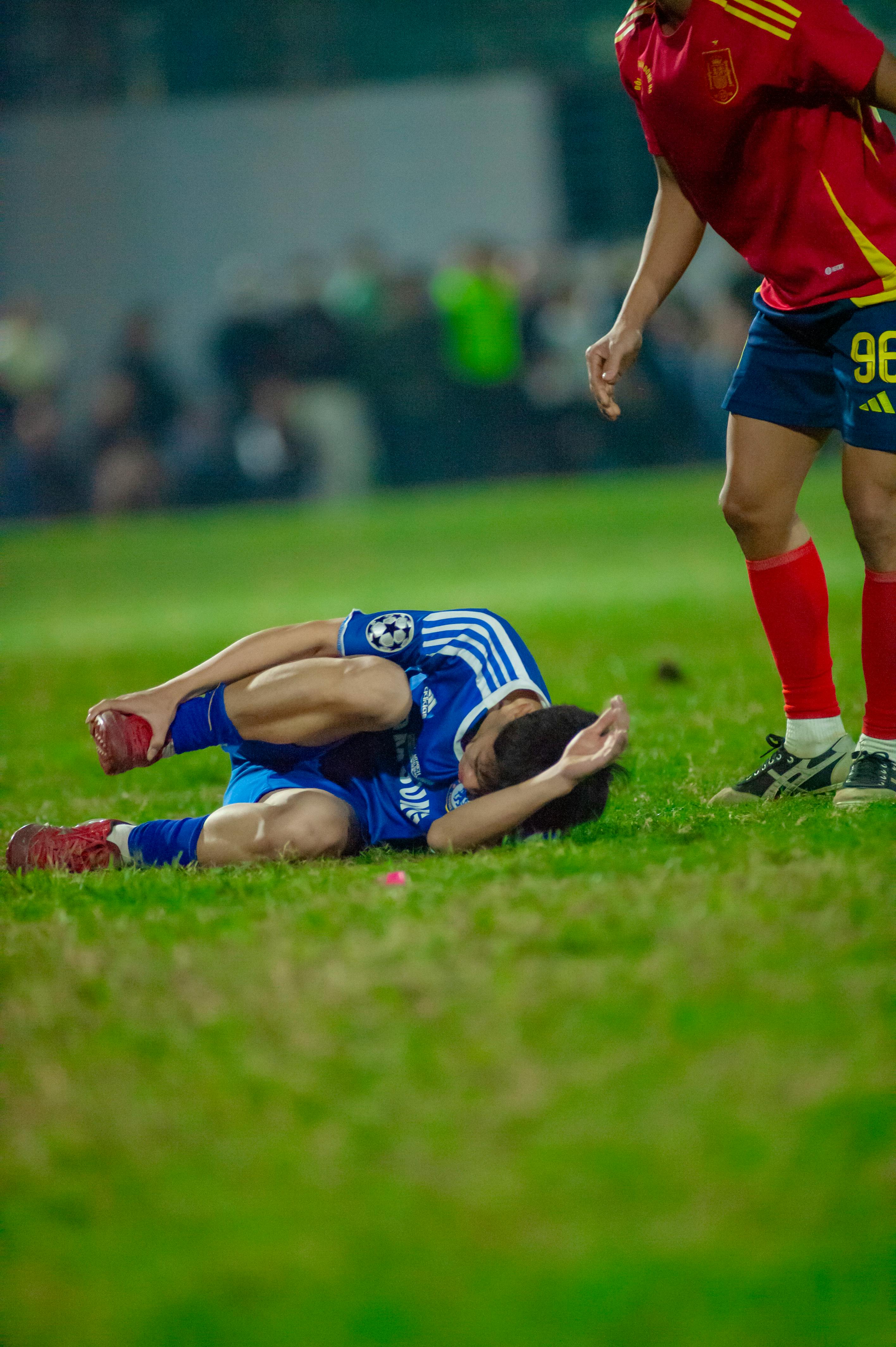 Dramatic Soccer Injury on the Field in Hanoi · Free Stock Photo