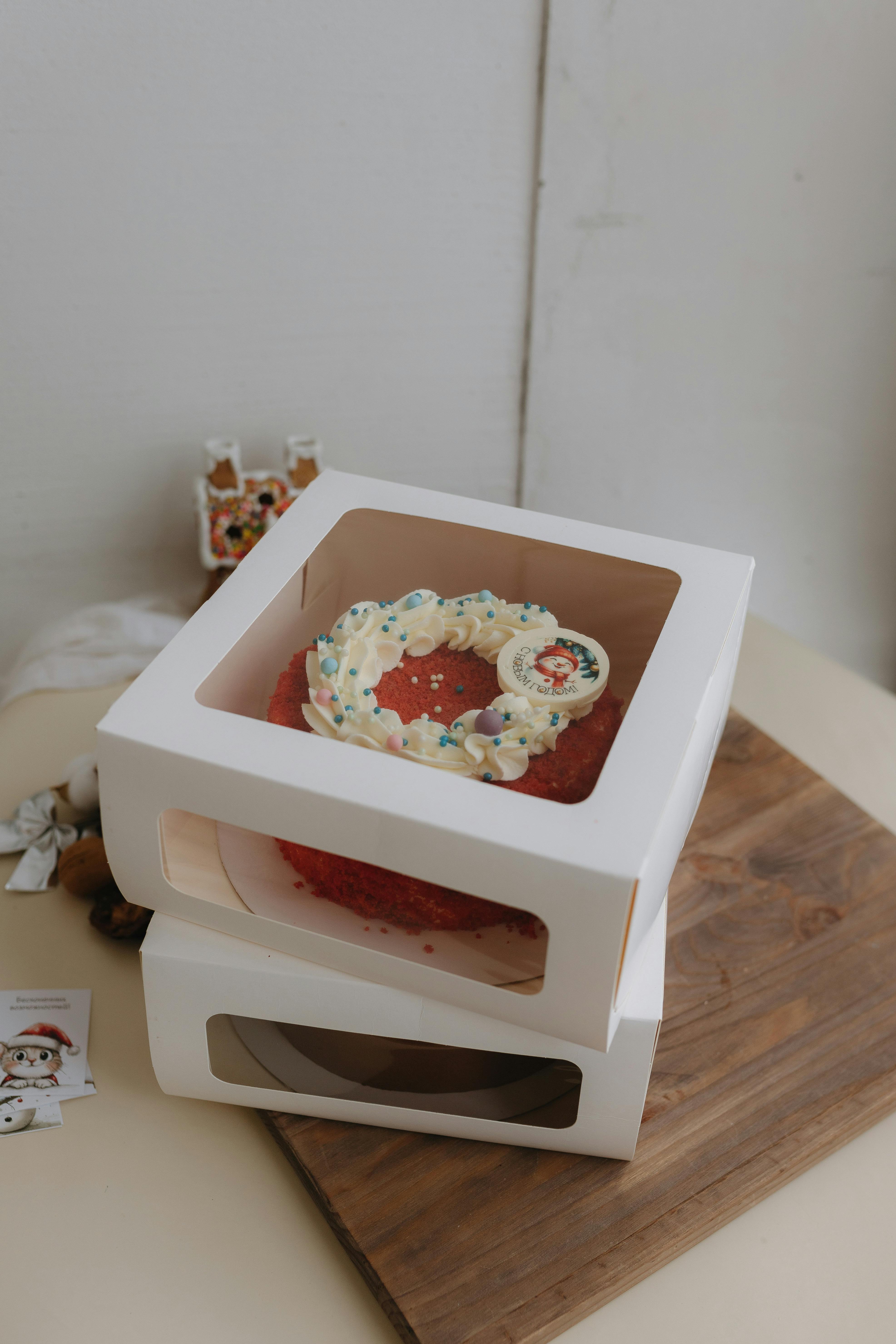 Festive Red Velvet Cake in Decorative Box · Free Stock Photo