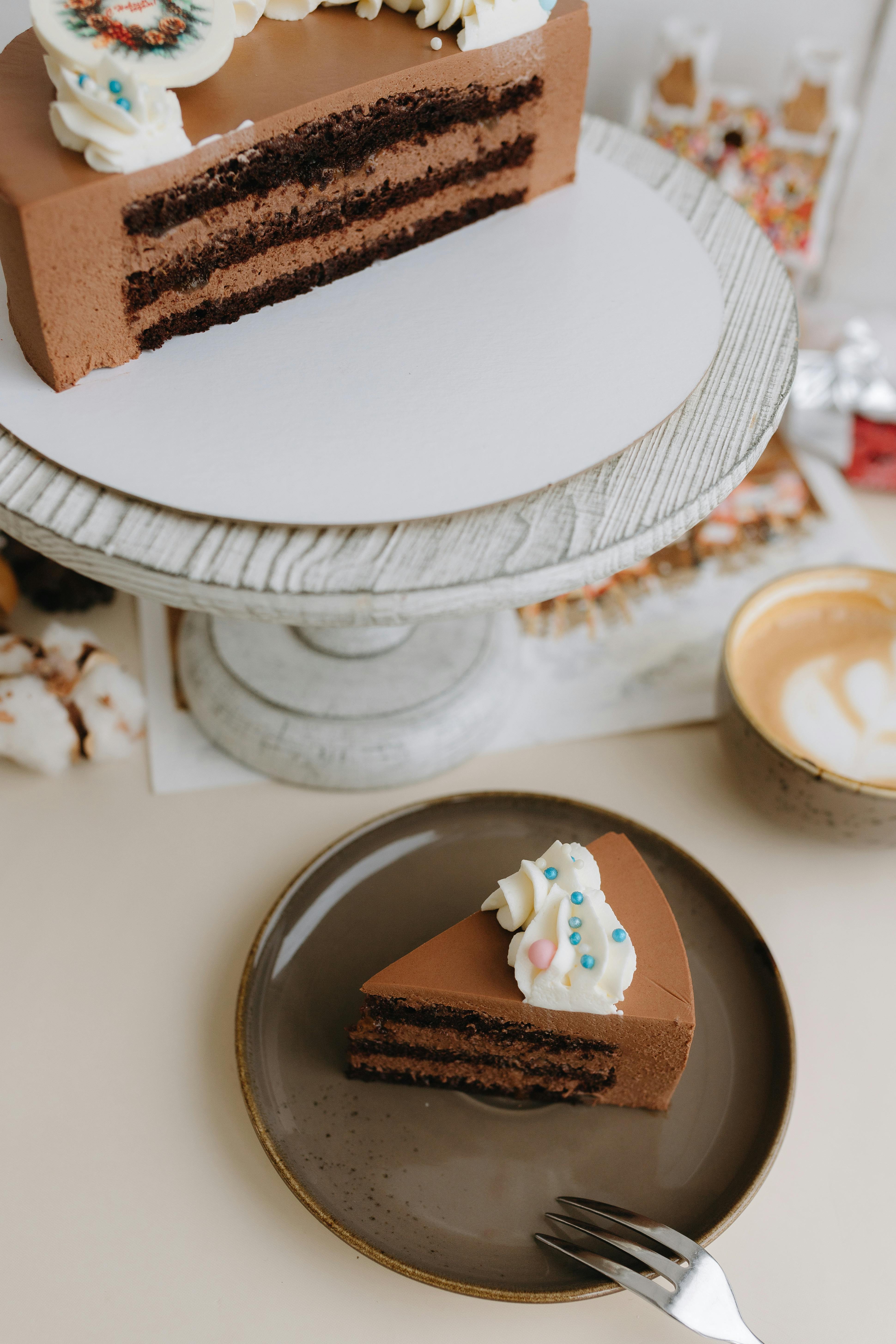 Shallow Focus of White Icing-covered Cake on White Ceramic Plate · Free ...