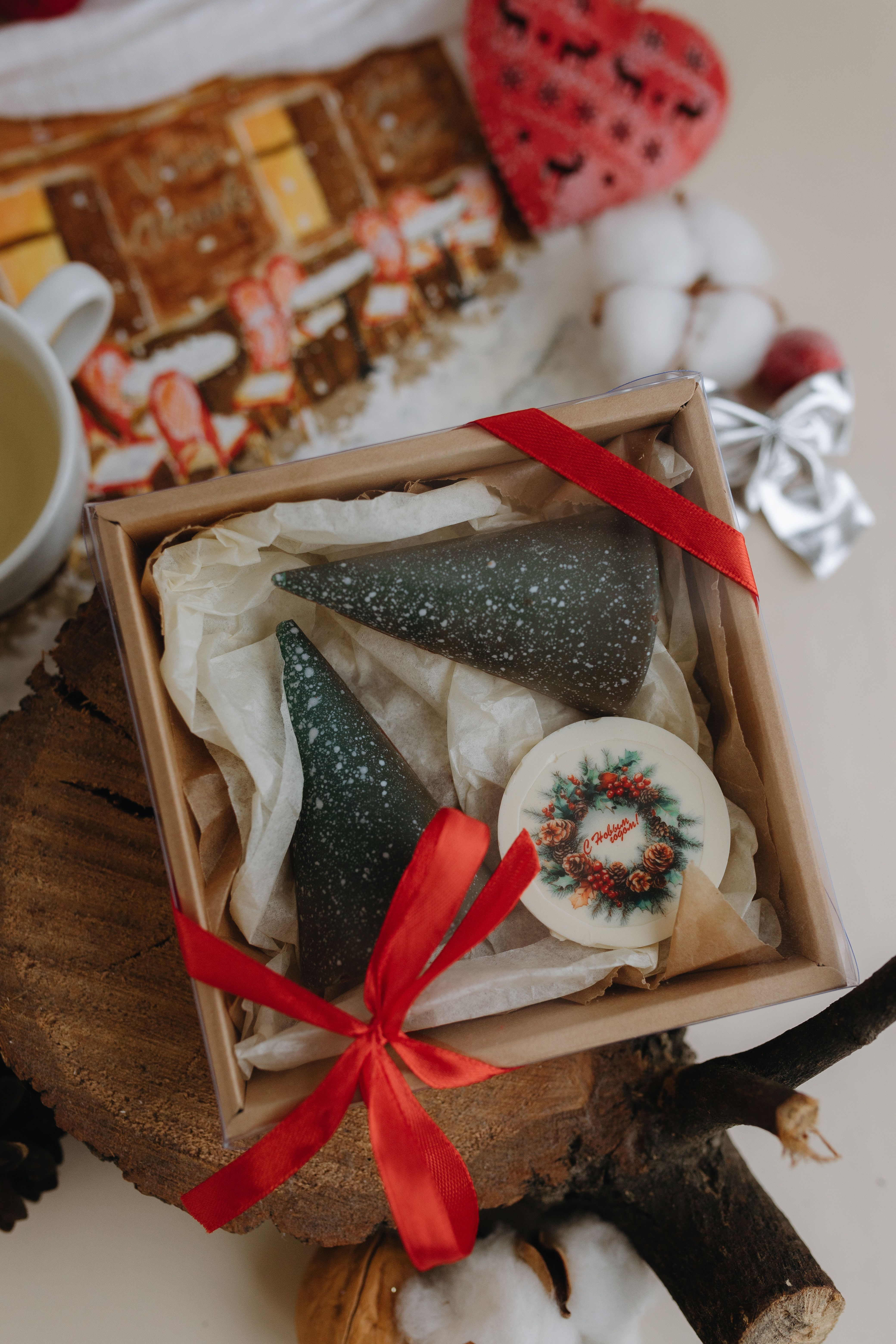 Festive Holiday Gift Box with Red Ribbon · Free Stock Photo