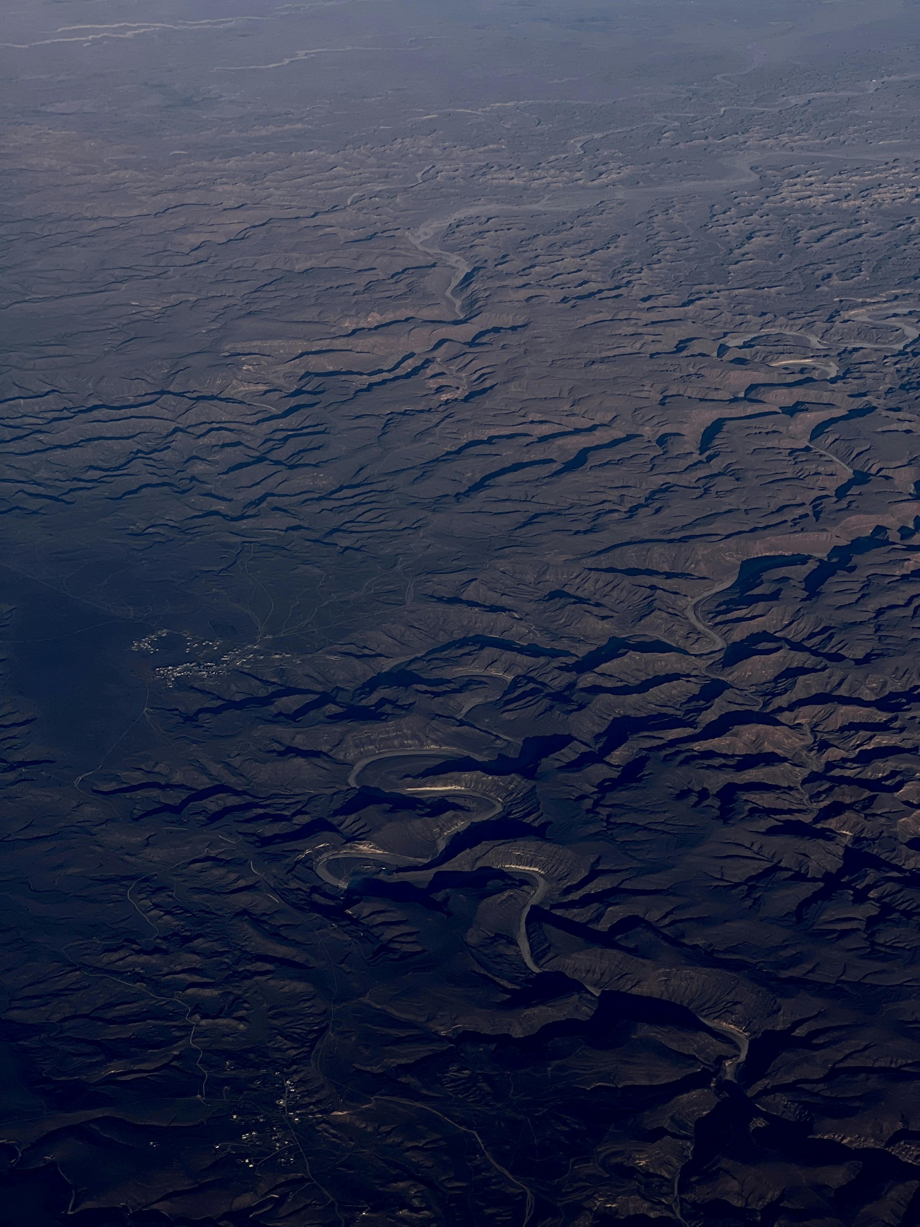 Aerial View of Rugged Terrain Landscape · Free Stock Photo