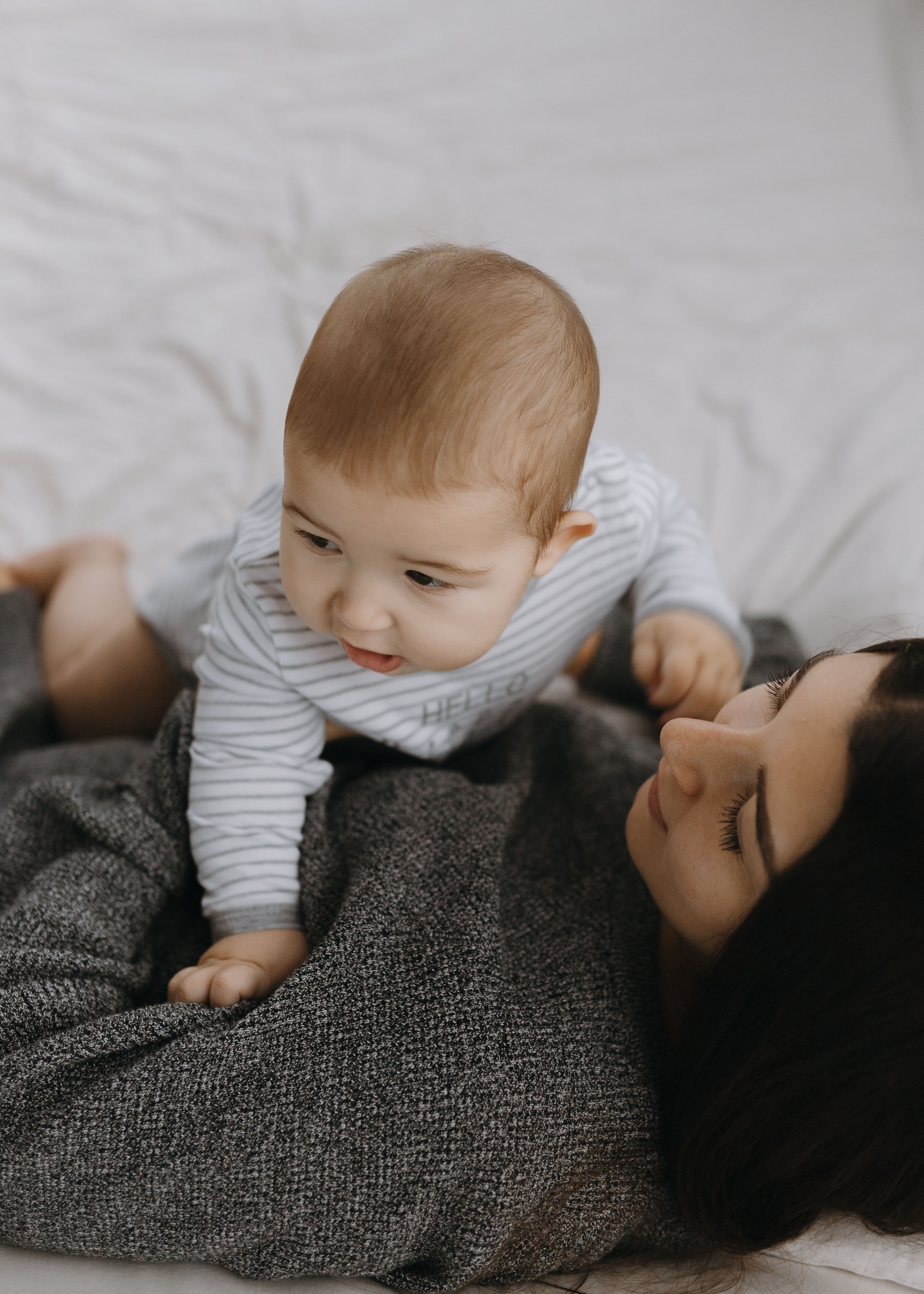 Mother and Baby Bonding in Cozy Home Setting · Free Stock Photo