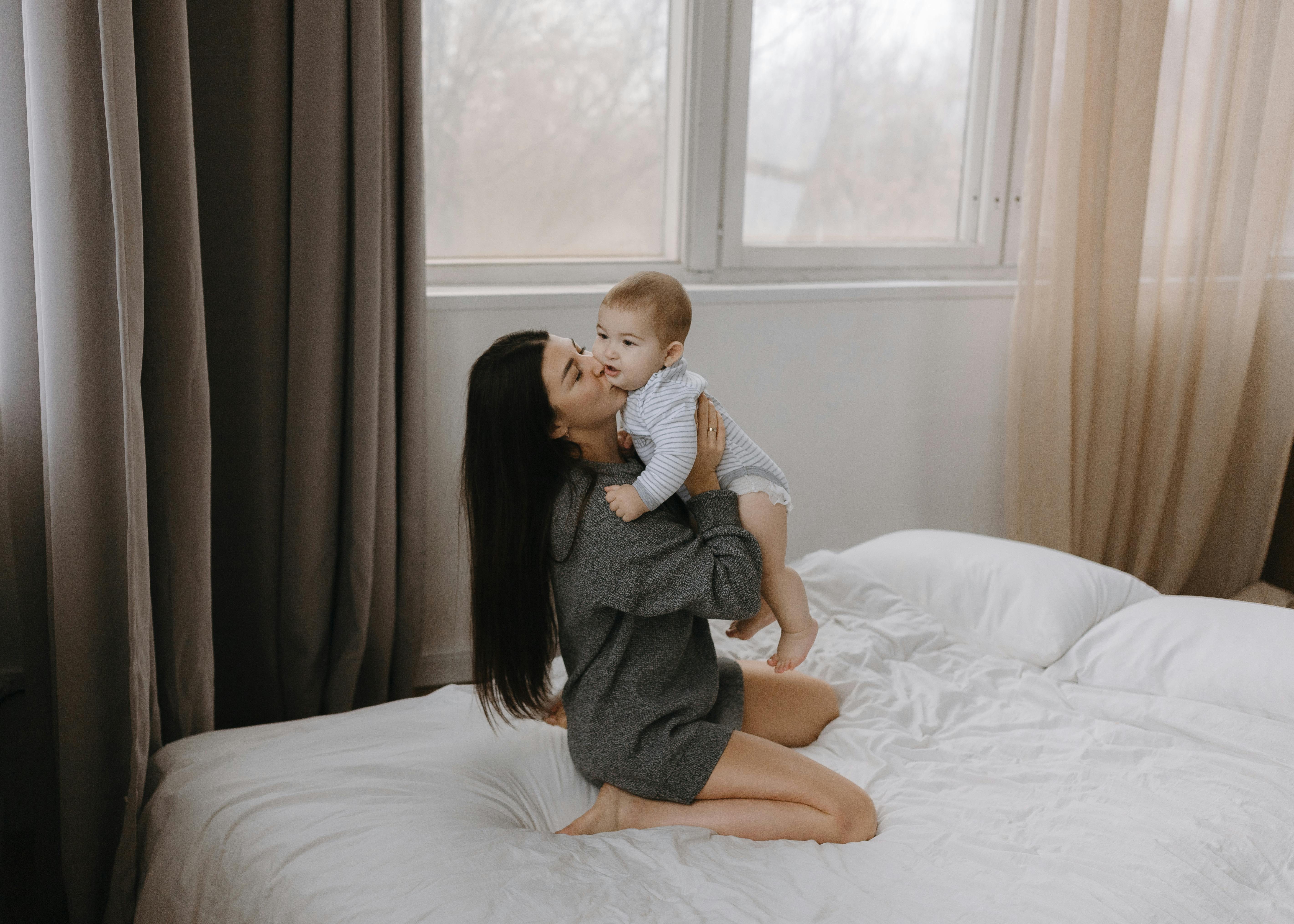 Mother and Baby Bonding in Cozy Bedroom · Free Stock Photo