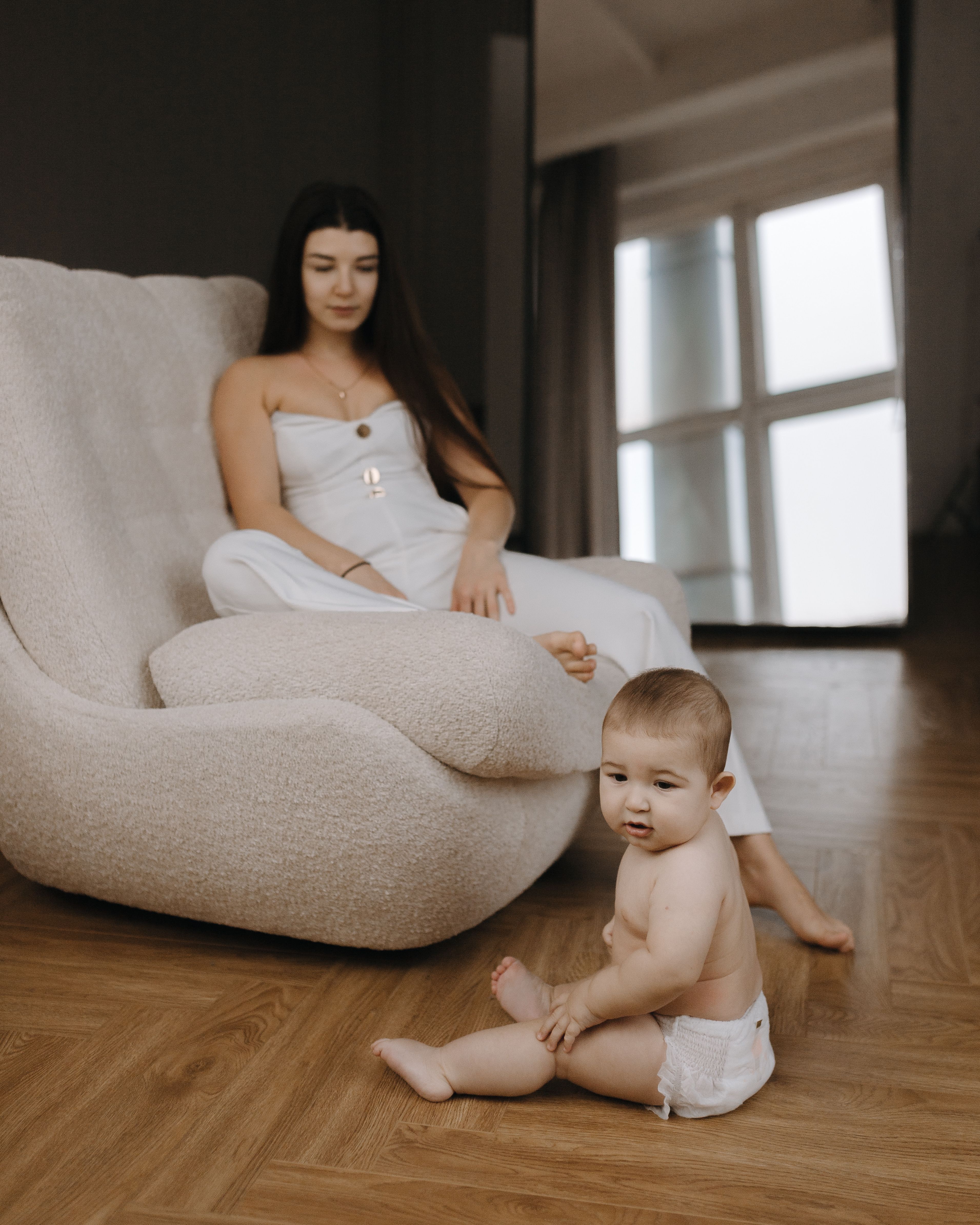 Mother and Baby Bonding in Cozy Indoor Setting · Free Stock Photo