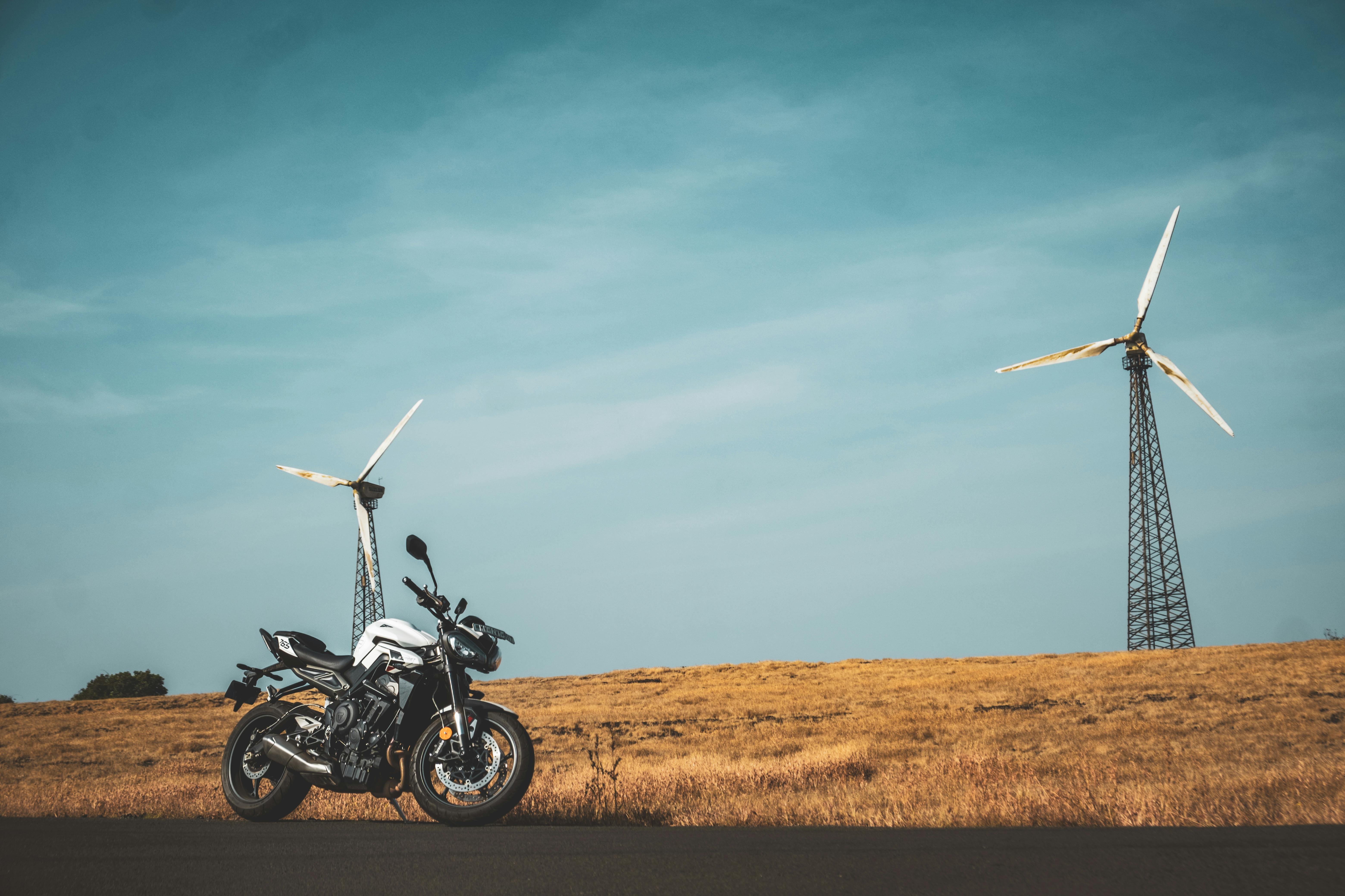 Motorcycle Adventure in Indian Wind Farm Landscape · Free Stock Photo