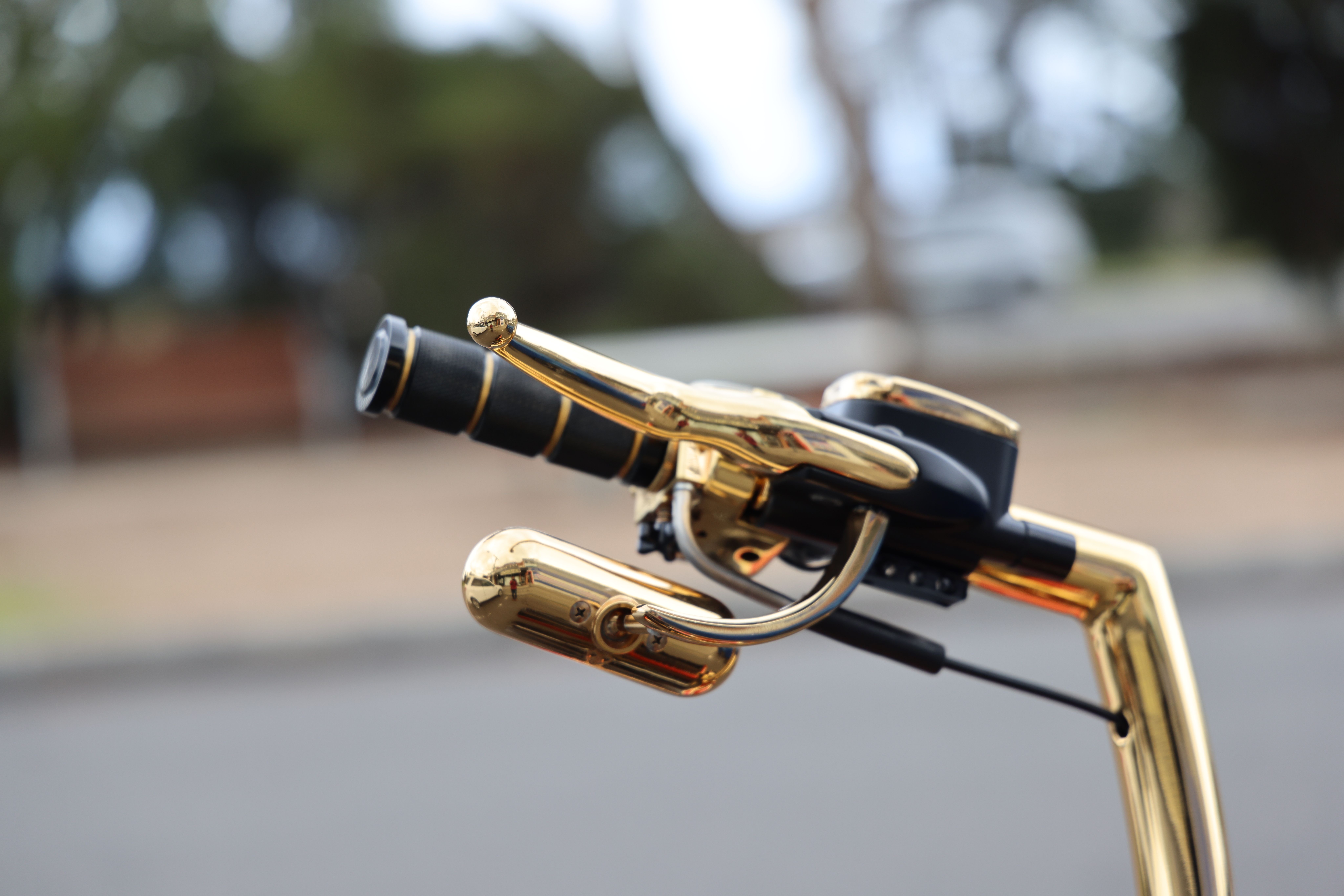 Luxurious Gold Scooter Handle with Black Grip · Free Stock Photo