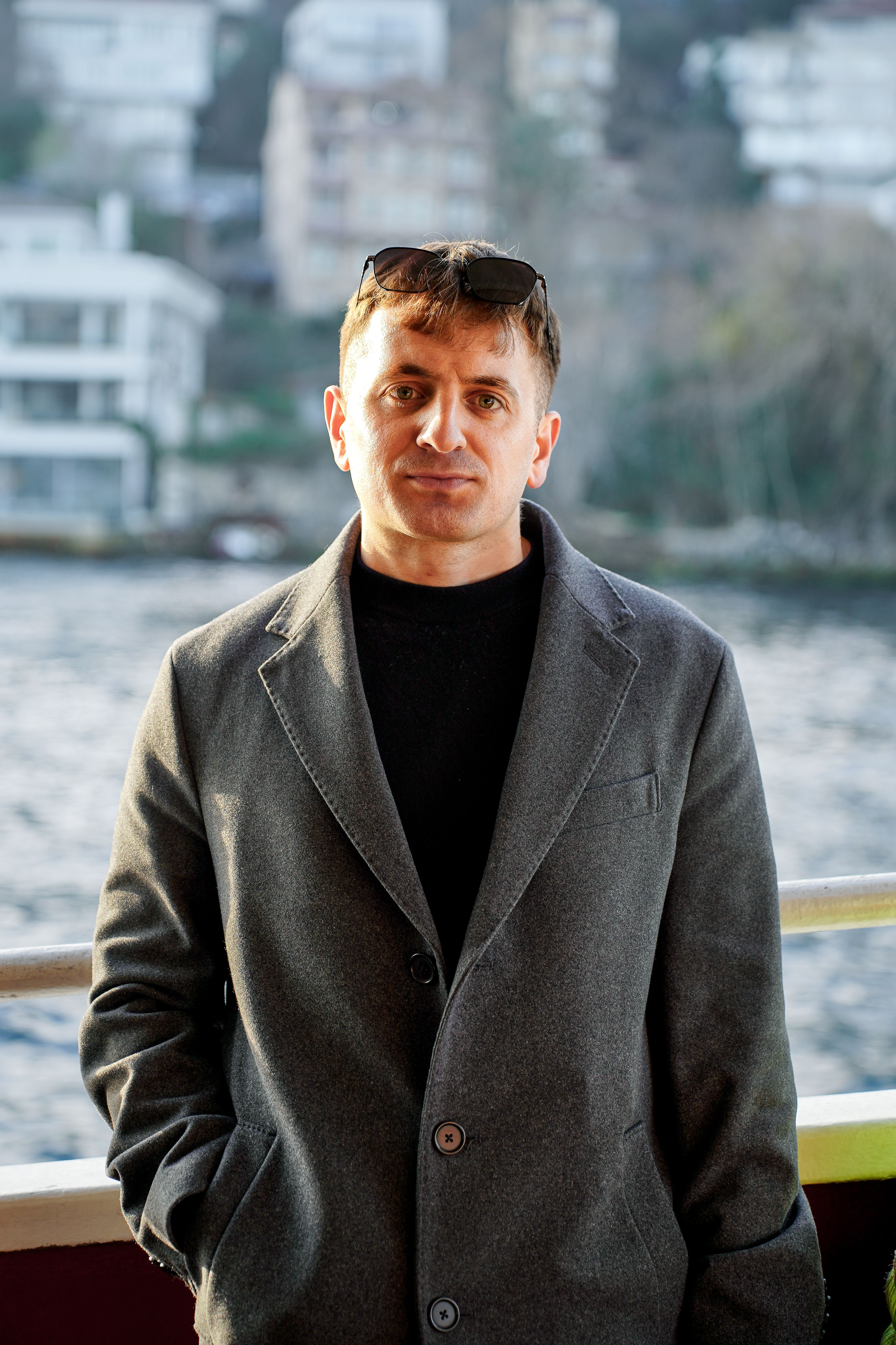 Portrait of a Man by the Riverfront · Free Stock Photo