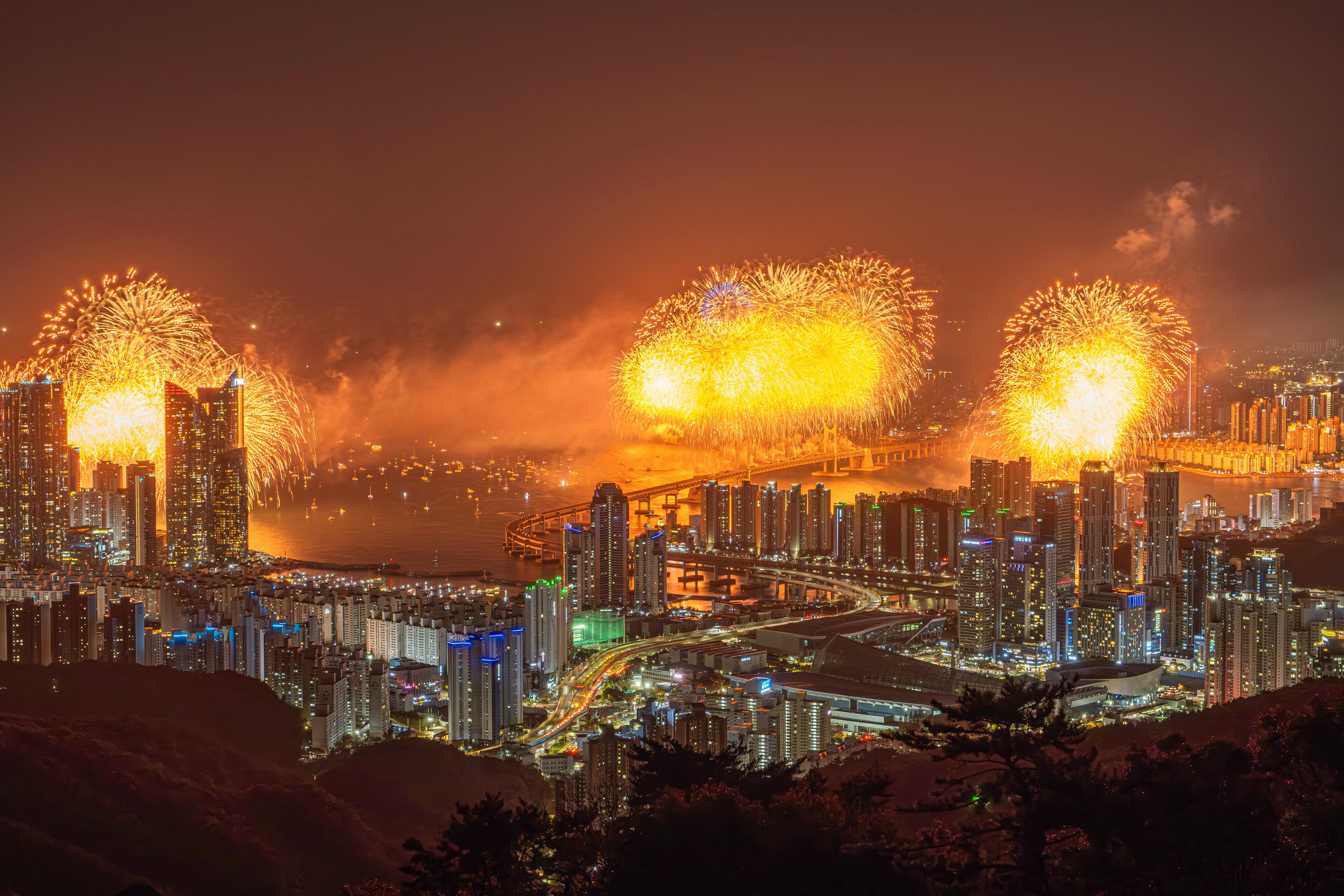 Vibrant Fireworks Over Busan Cityscape at Night · Free Stock Photo