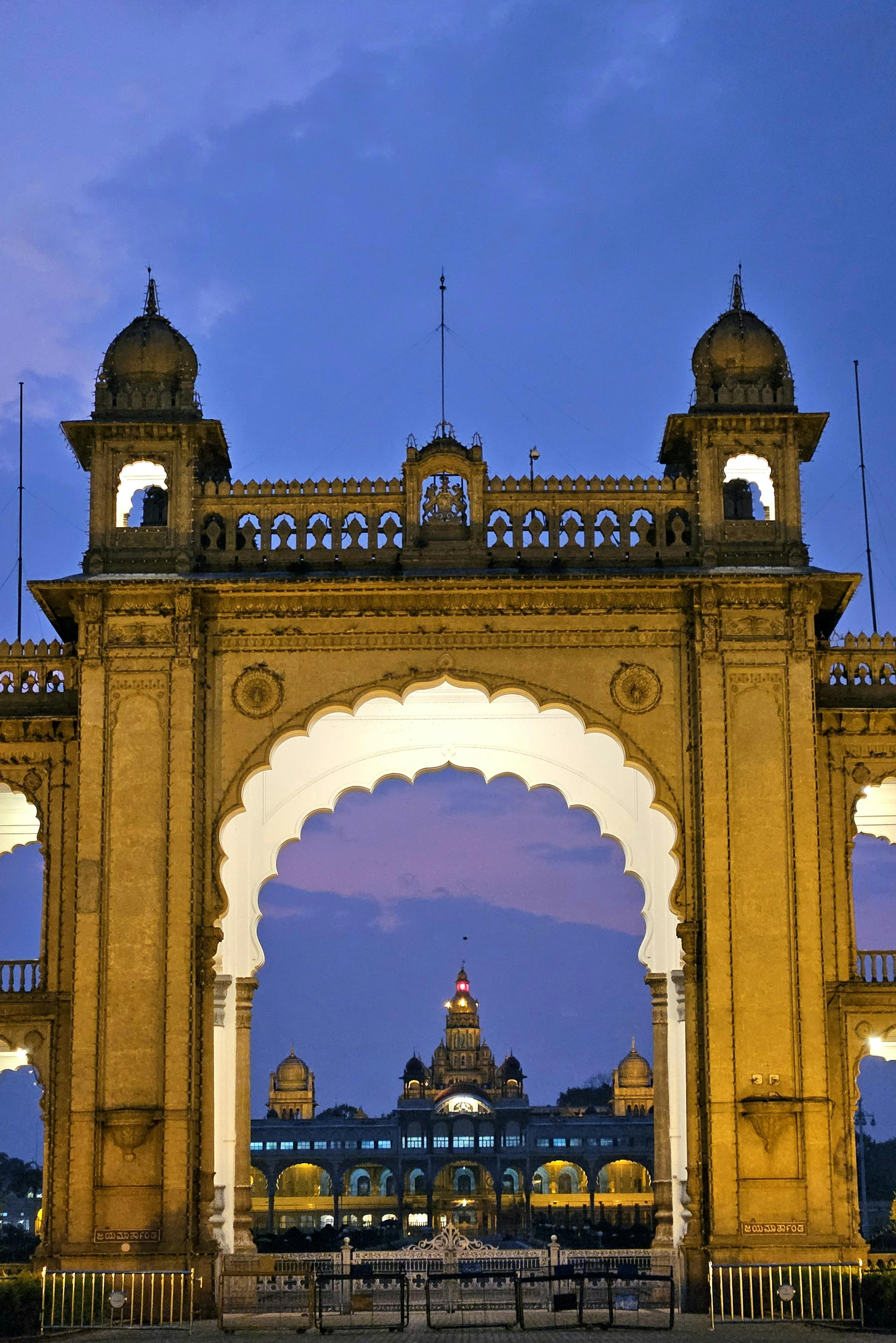 Illuminated Mysore Palace Gateway at Dusk · Free Stock Photo
