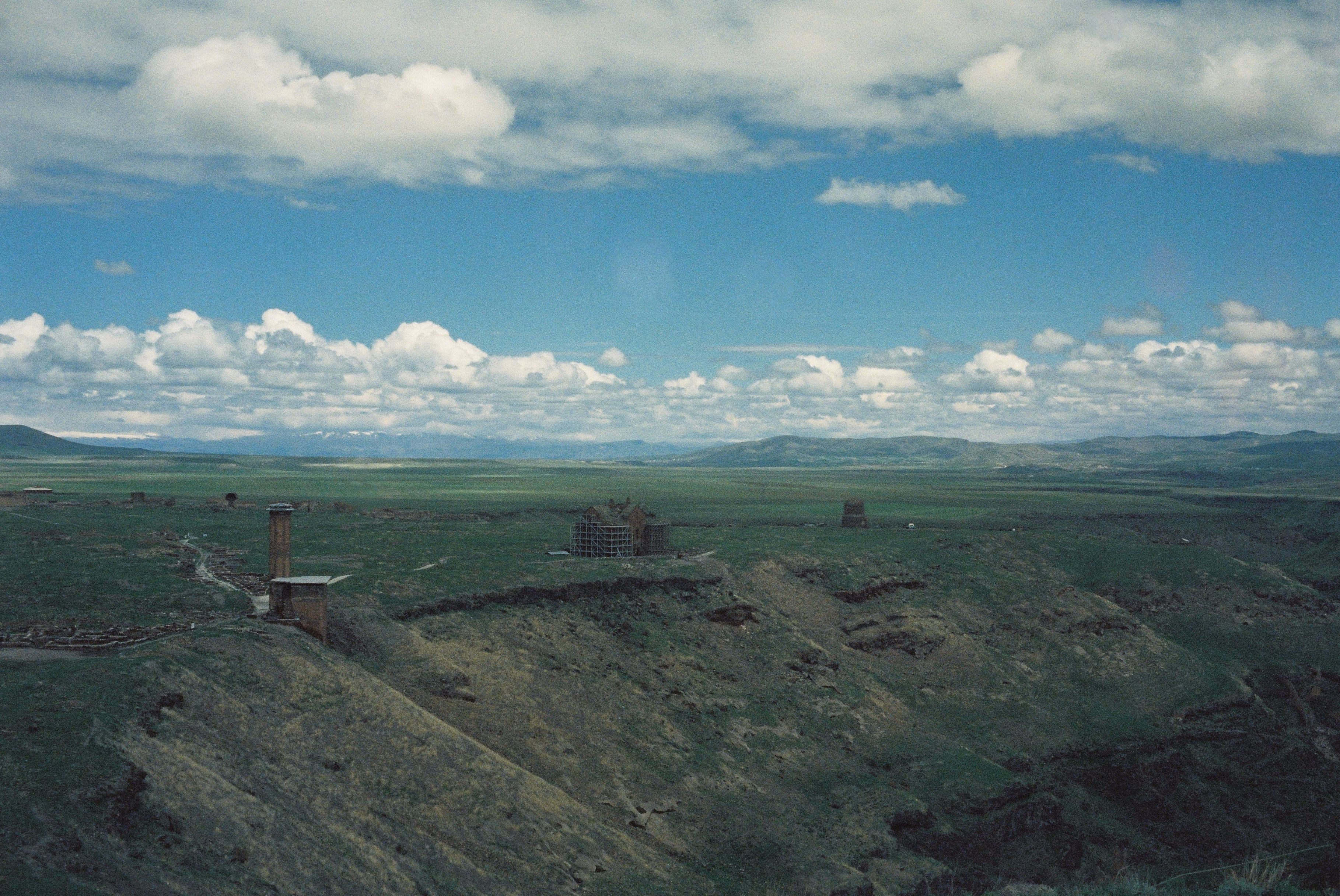 Expansive Landscape with Ancient Ruins · Free Stock Photo