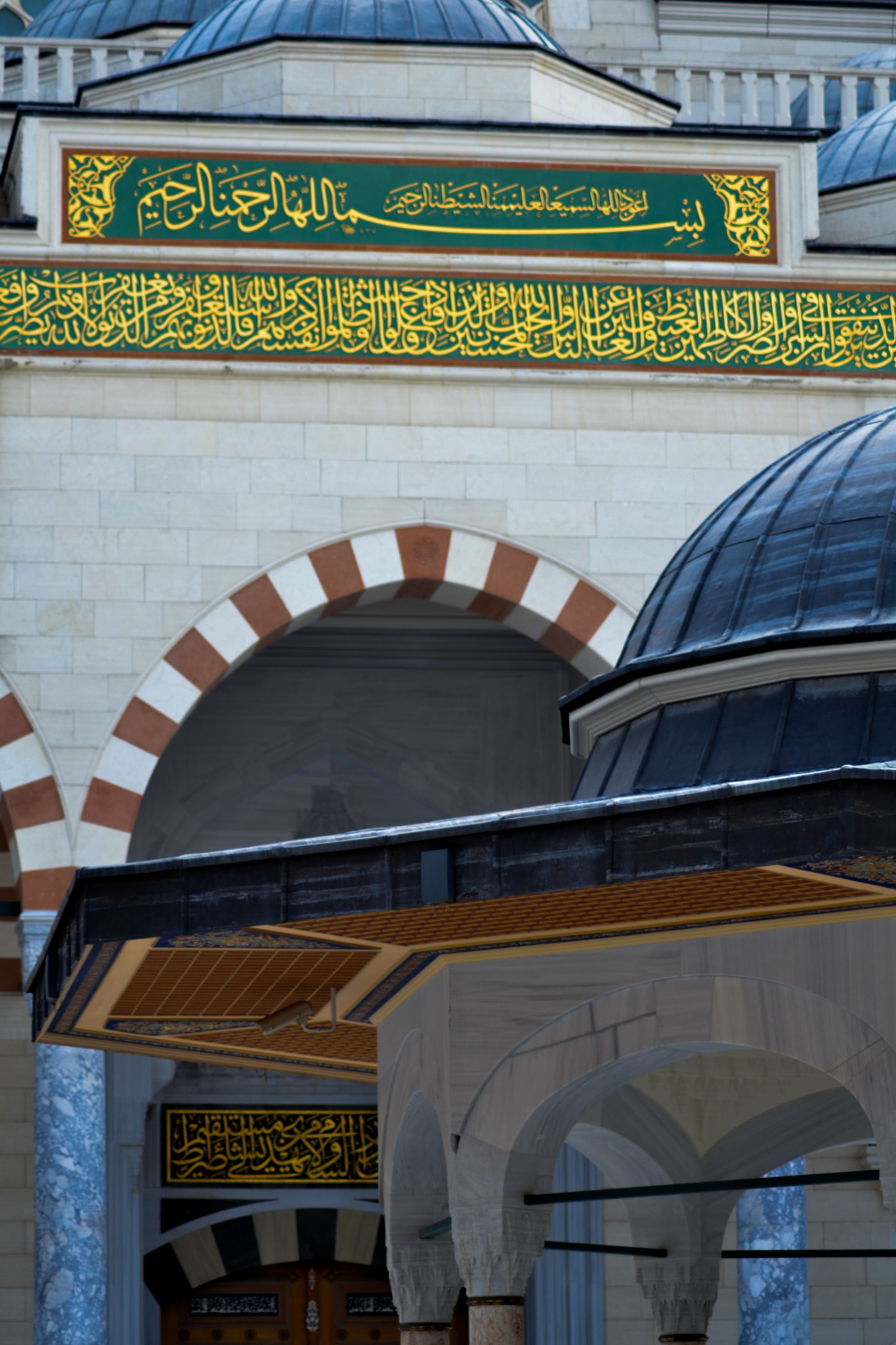 Ornate Architectural Details of Mosque Exterior · Free Stock Photo