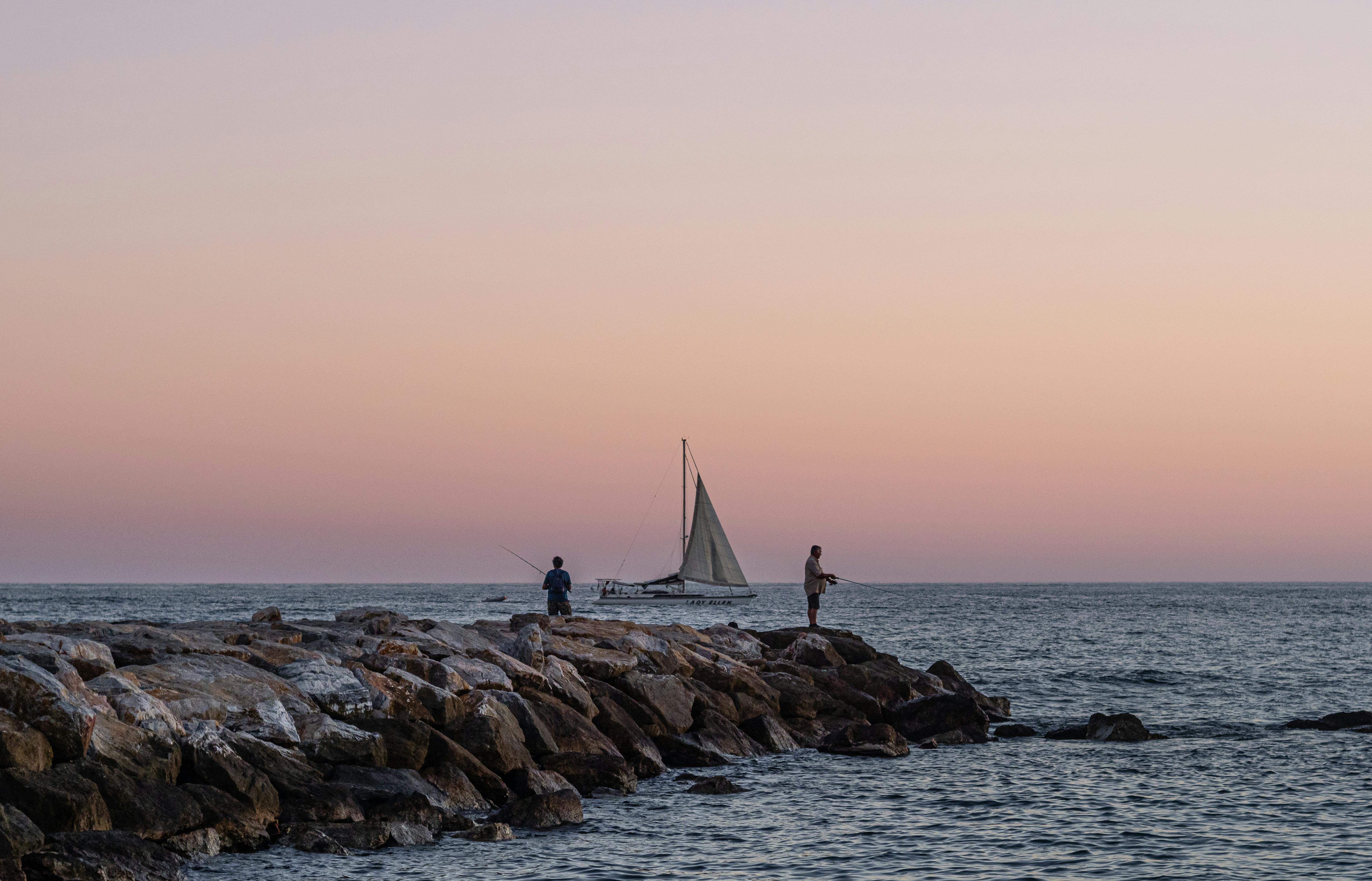 Fishing at Sunset on Torrenueva Costa Beach · Free Stock Photo