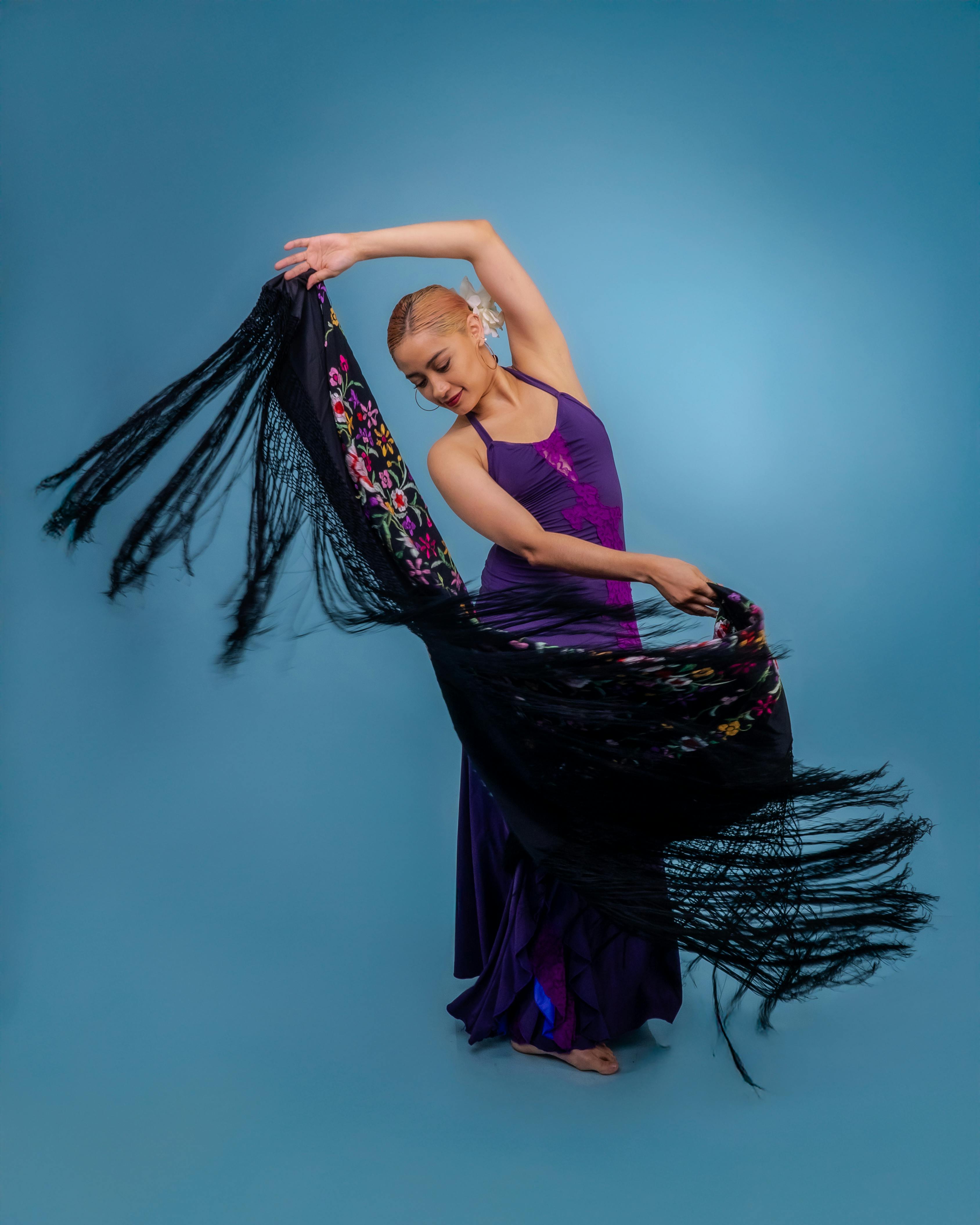 Elegant Dancer Performing in Vibrant Attire · Free Stock Photo