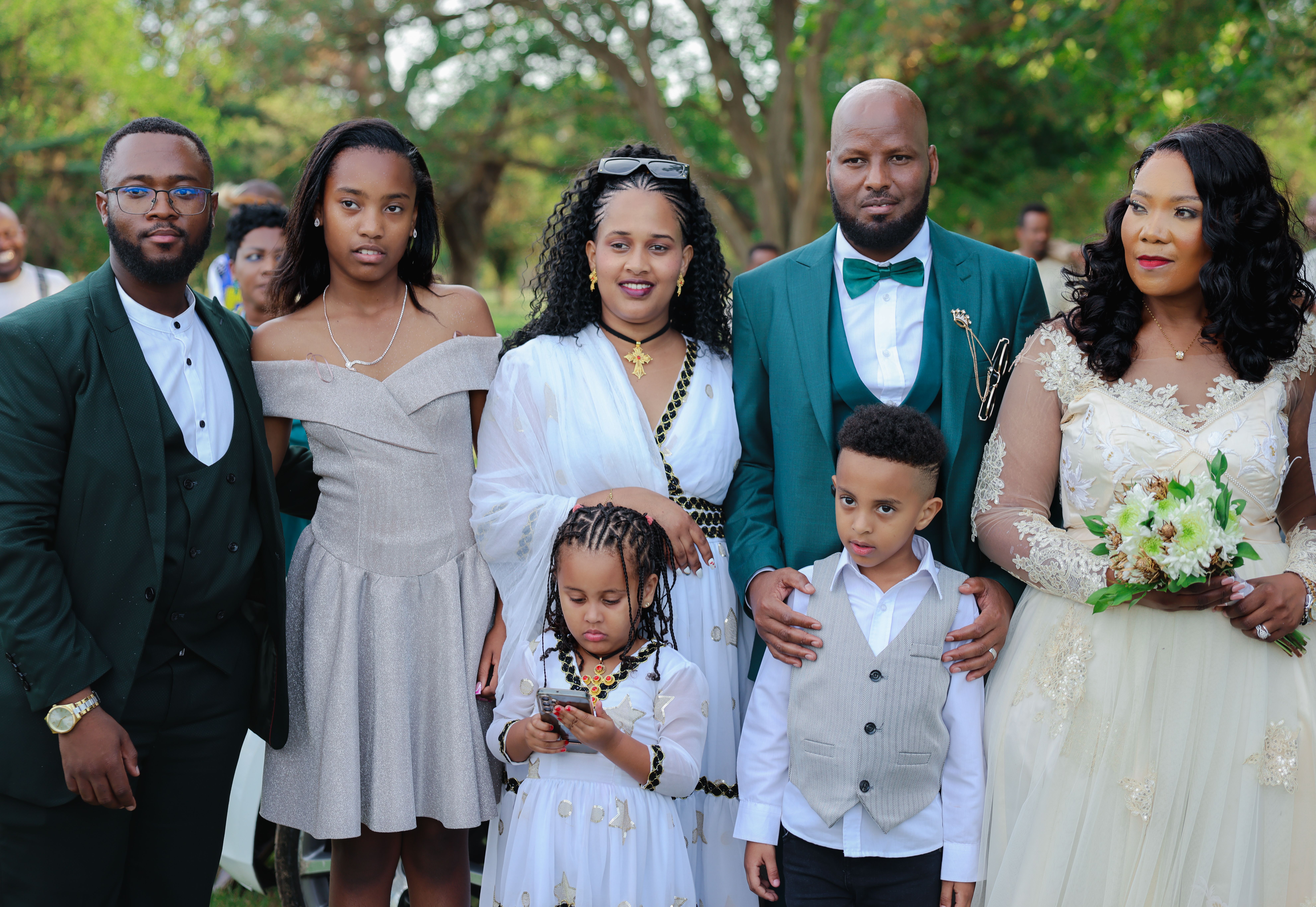 Elegant Family Portrait at Outdoor Wedding · Free Stock Photo