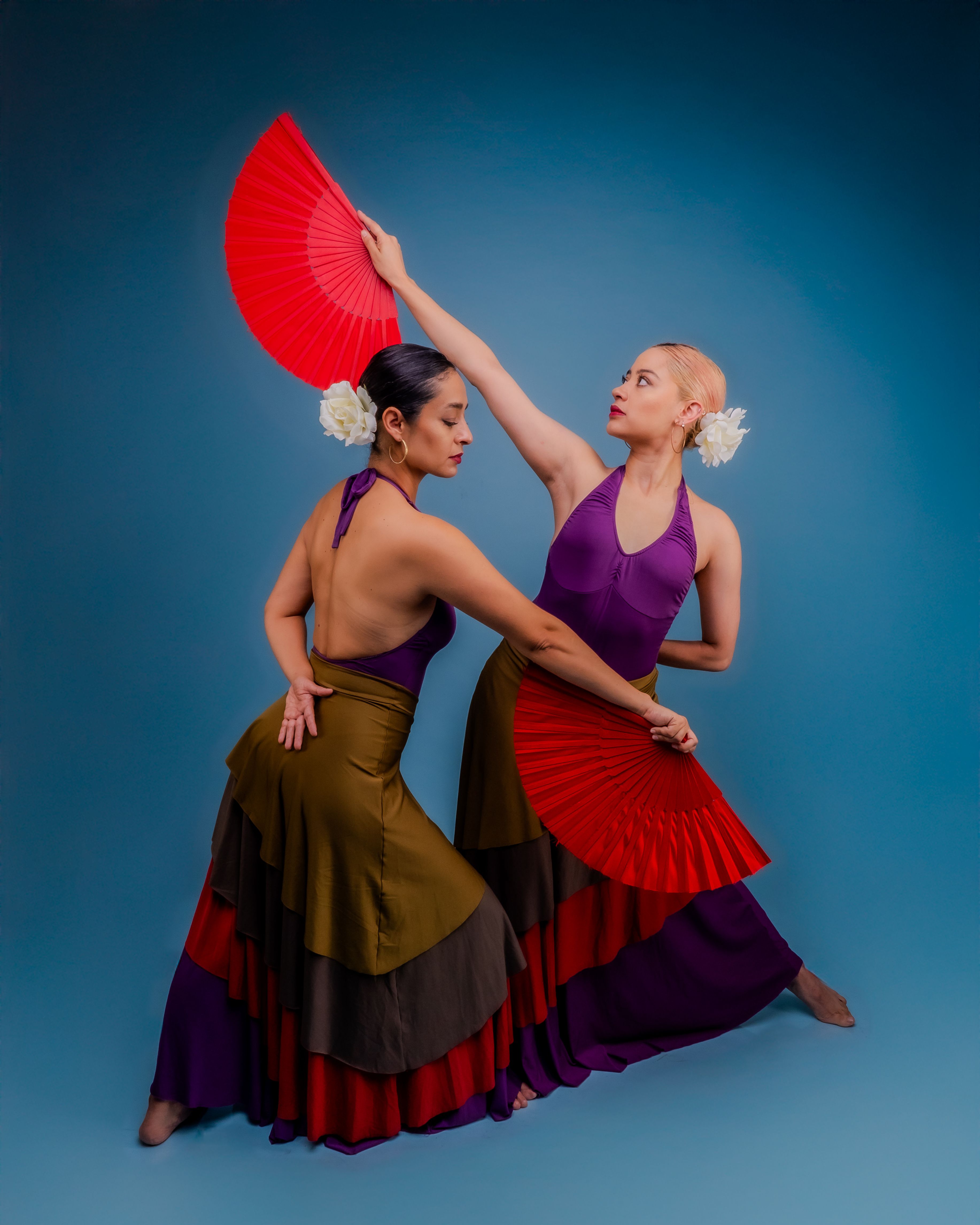 Elegant Flamenco Dancers in Vibrant Attire · Free Stock Photo