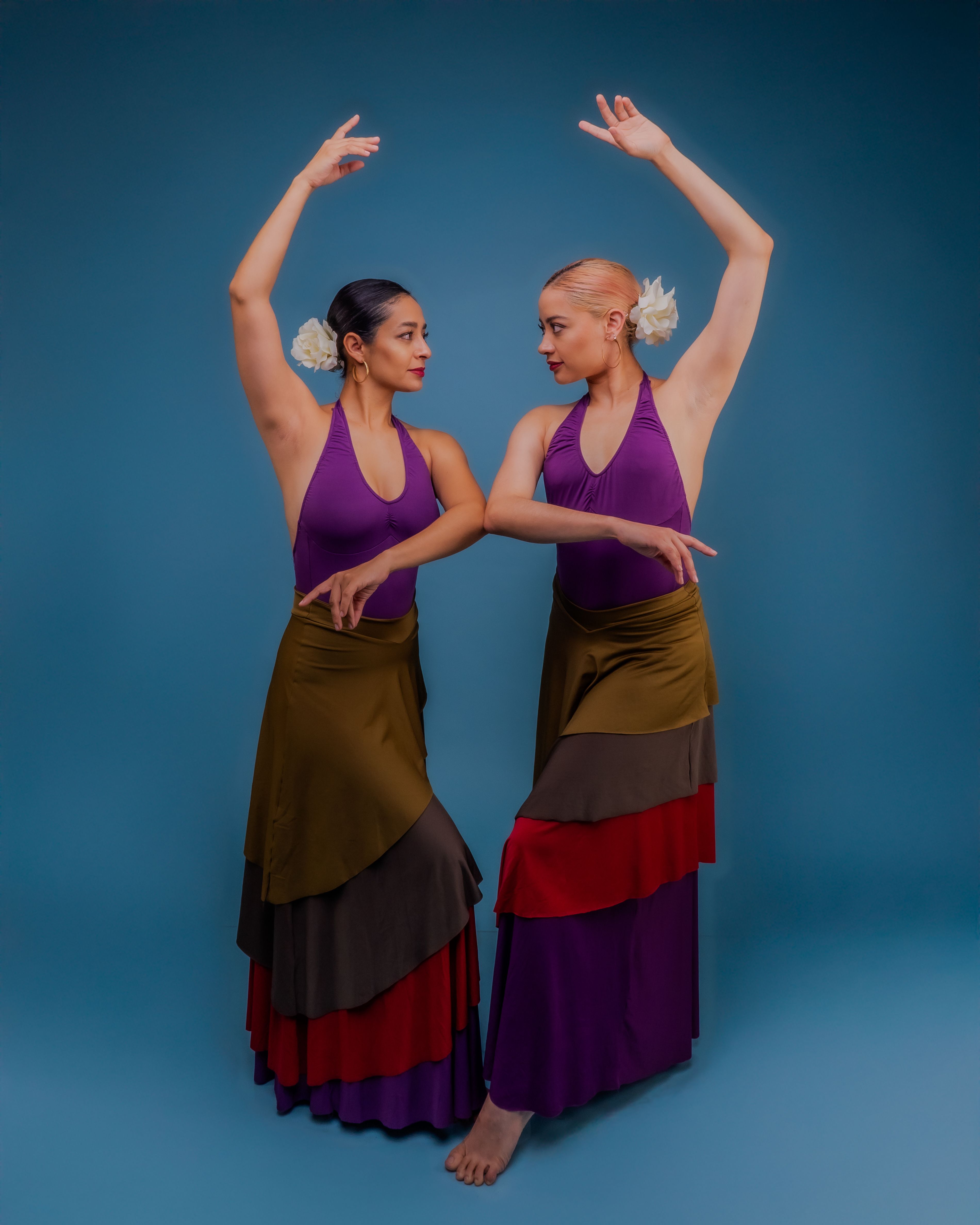 Elegant Flamenco Dancers in Vibrant Attire · Free Stock Photo