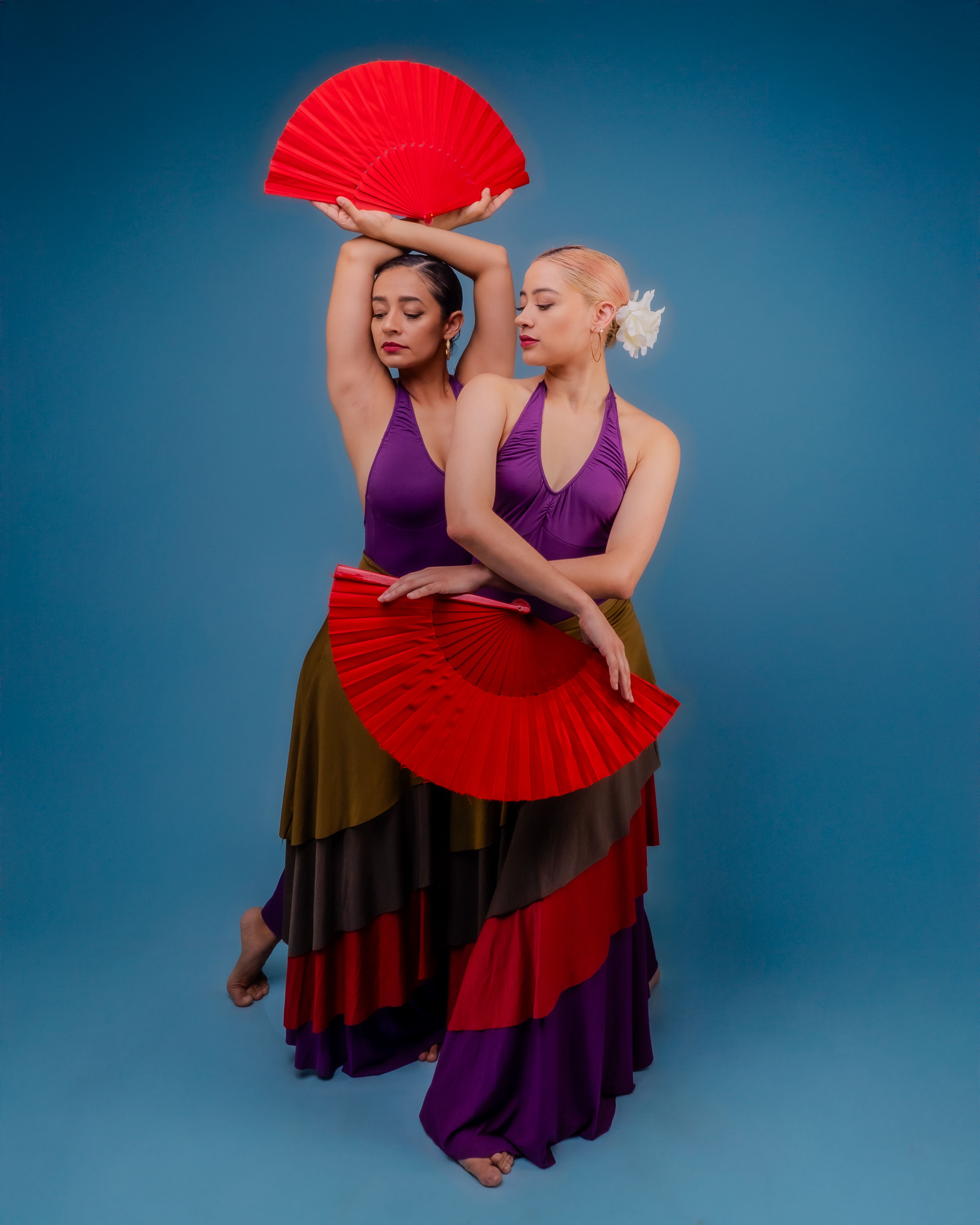 Colorful Flamenco Dancers with Red Fans · Free Stock Photo