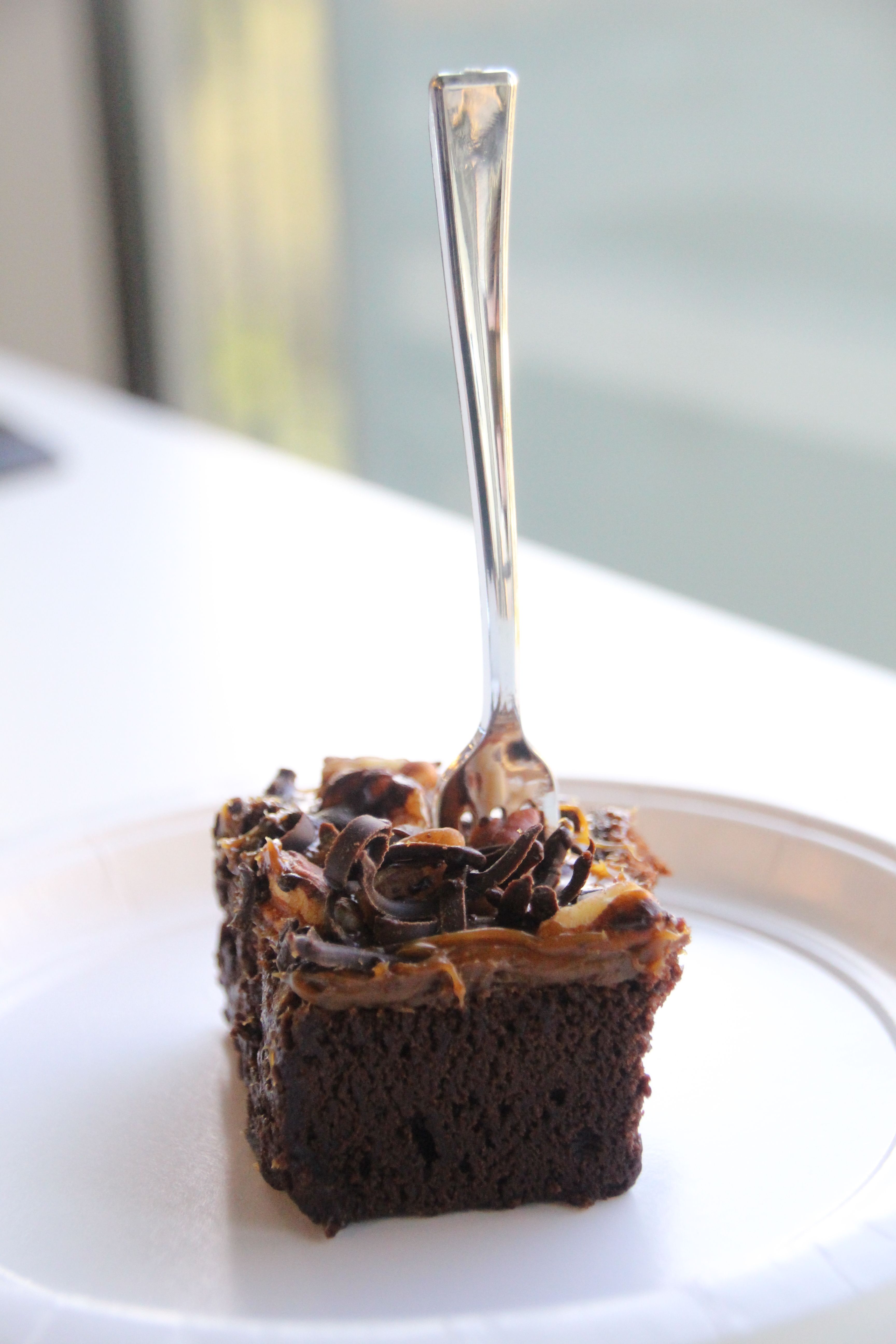 Rich Chocolate Cake with a Fork on Plate · Free Stock Photo