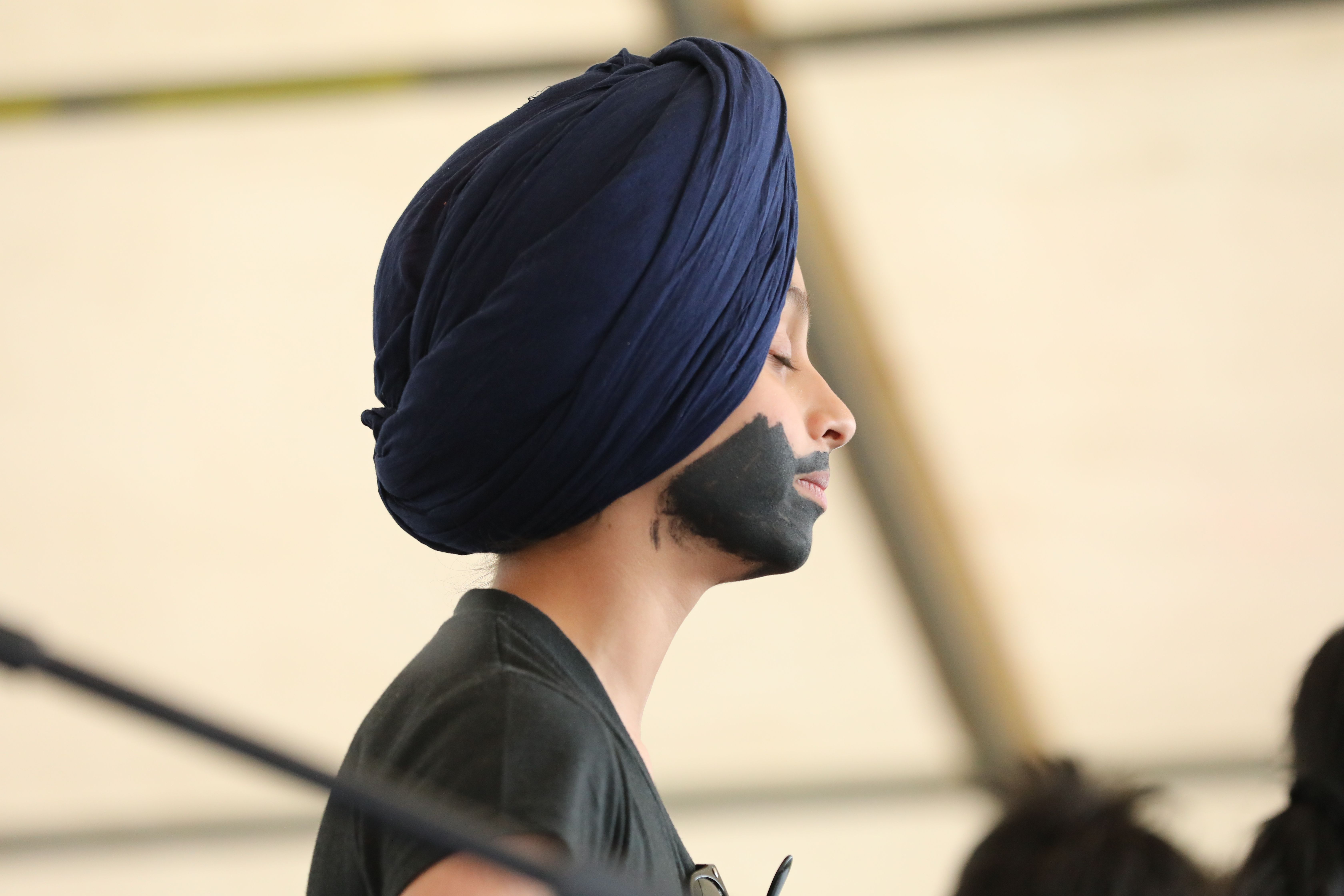 Profile of Person in Turban with Painted Face · Free Stock Photo