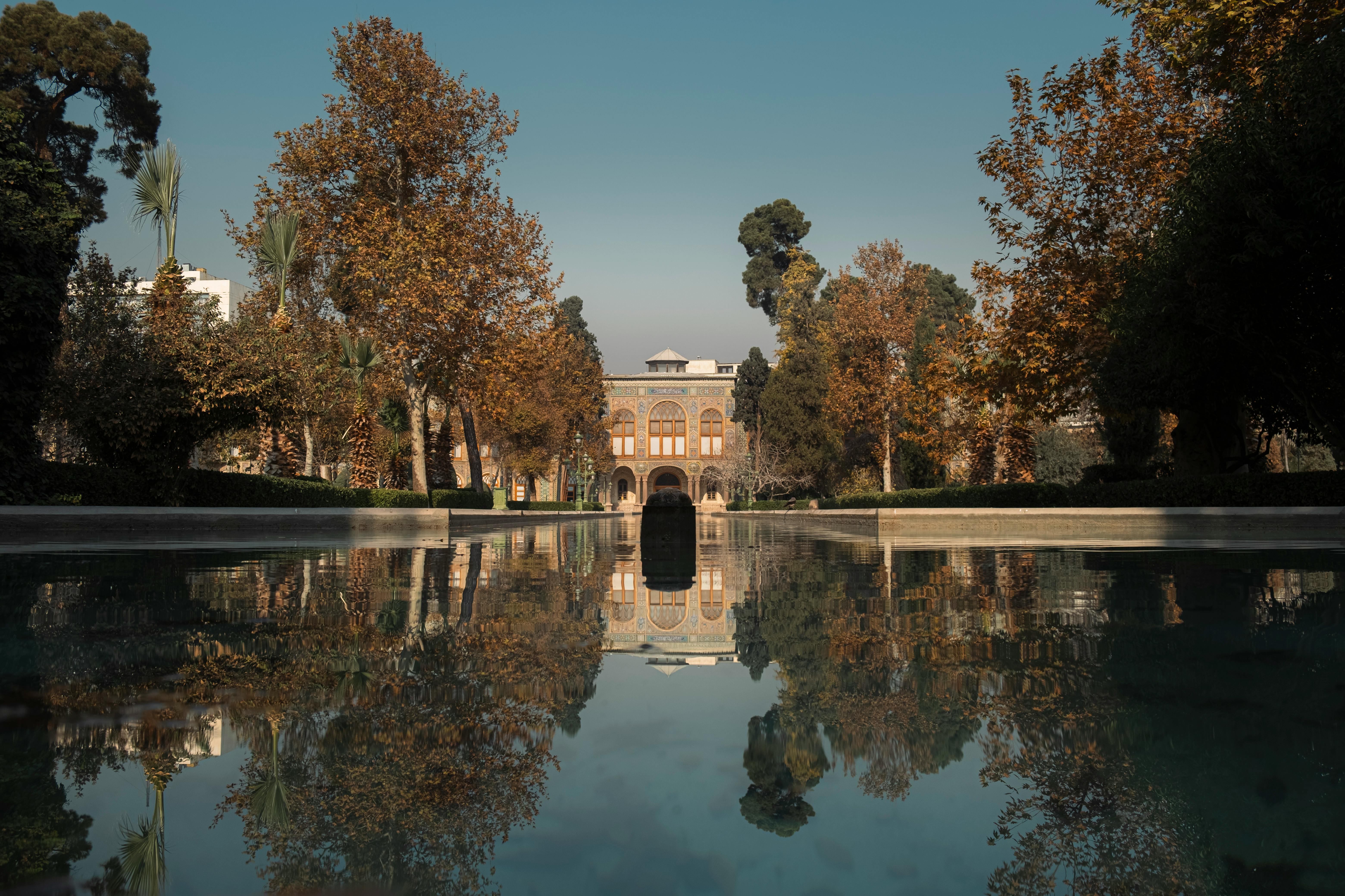 Tehran Palace Reflection with Autumn Foliage · Free Stock Photo
