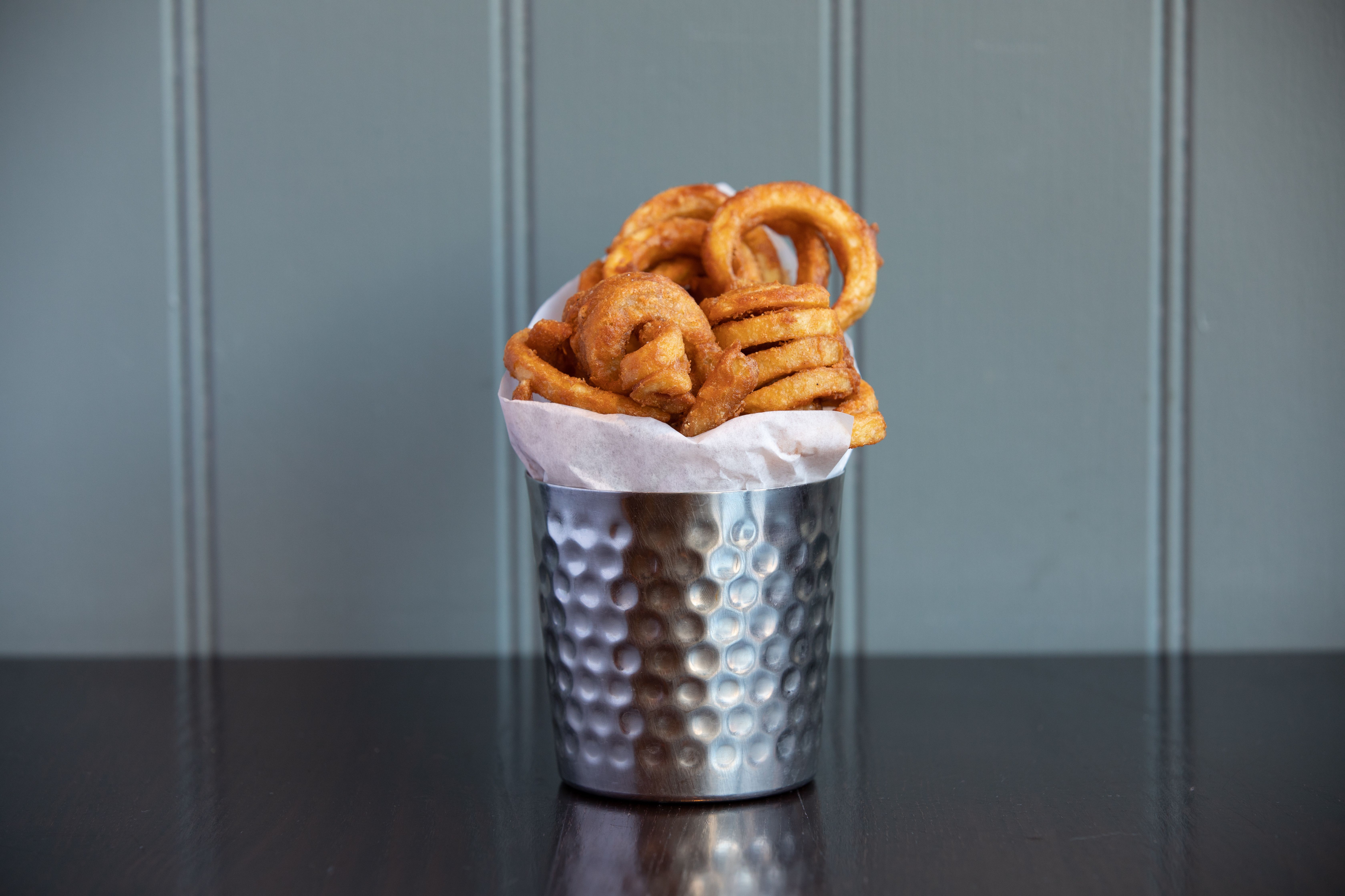 Crispy Curly Fries in Metal Cup · Free Stock Photo
