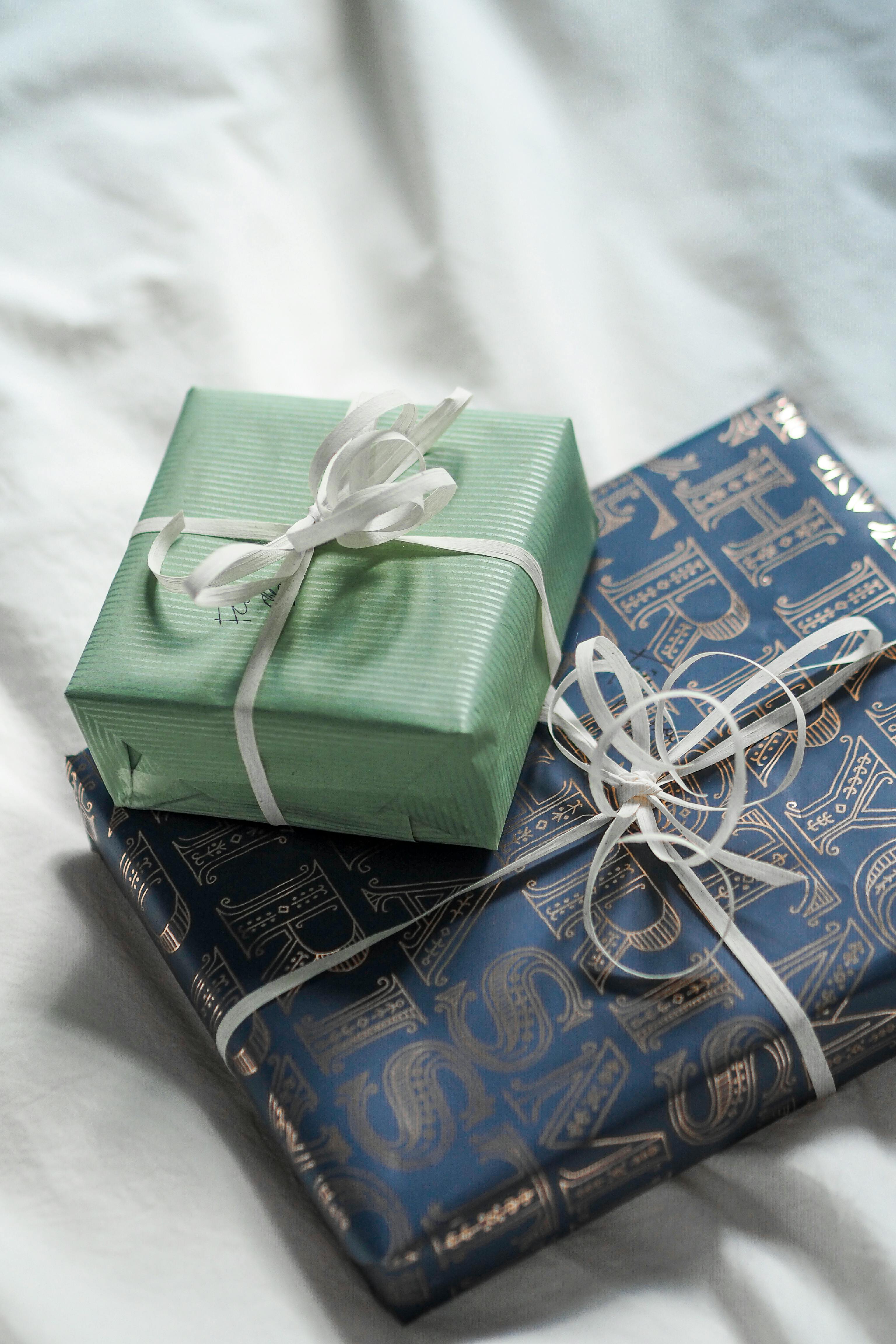 Elegant Gift Boxes Wrapped in Stylish Paper · Free Stock Photo