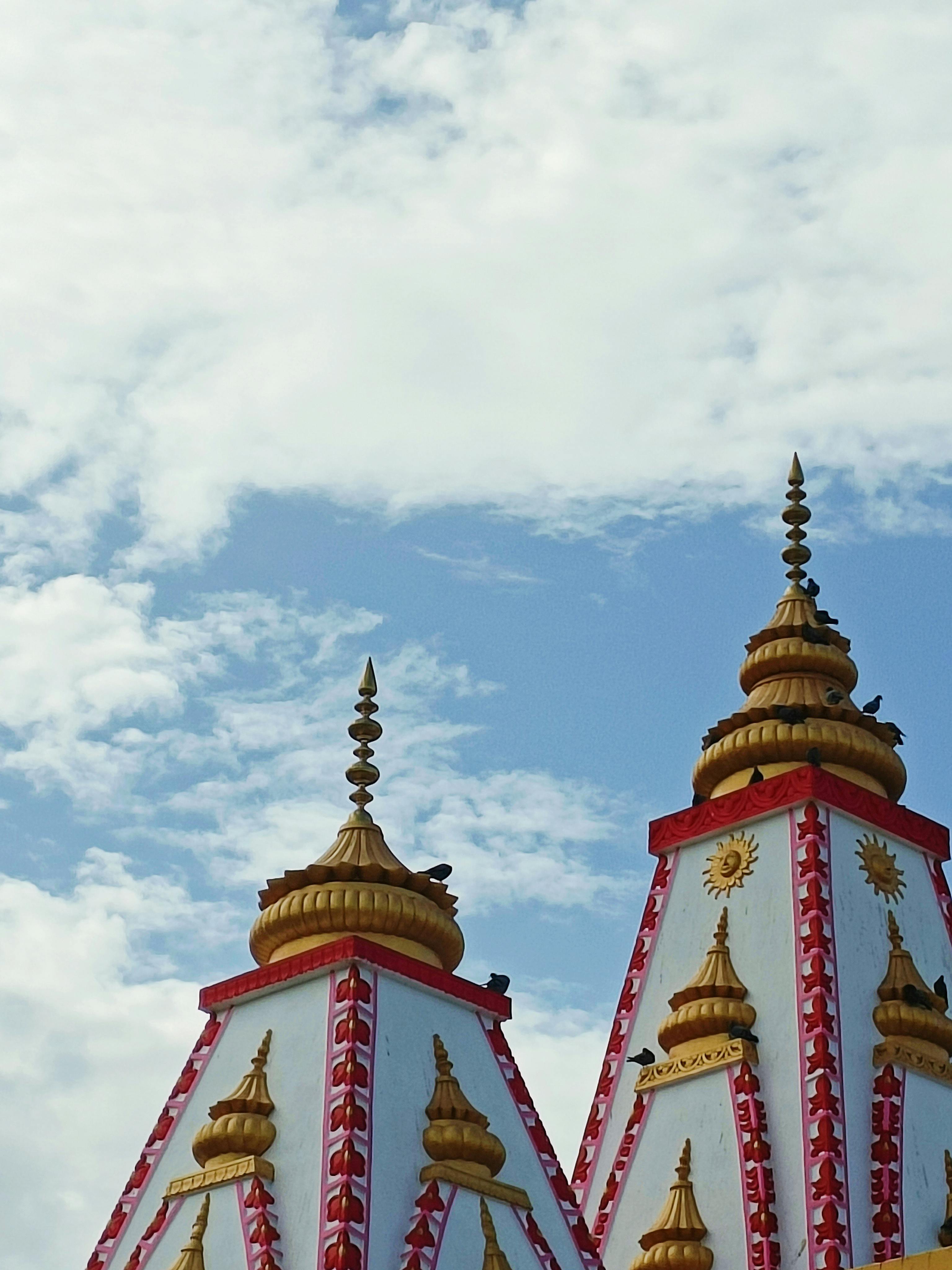Ornate Temple Spires Against a Clear Sky · Free Stock Photo