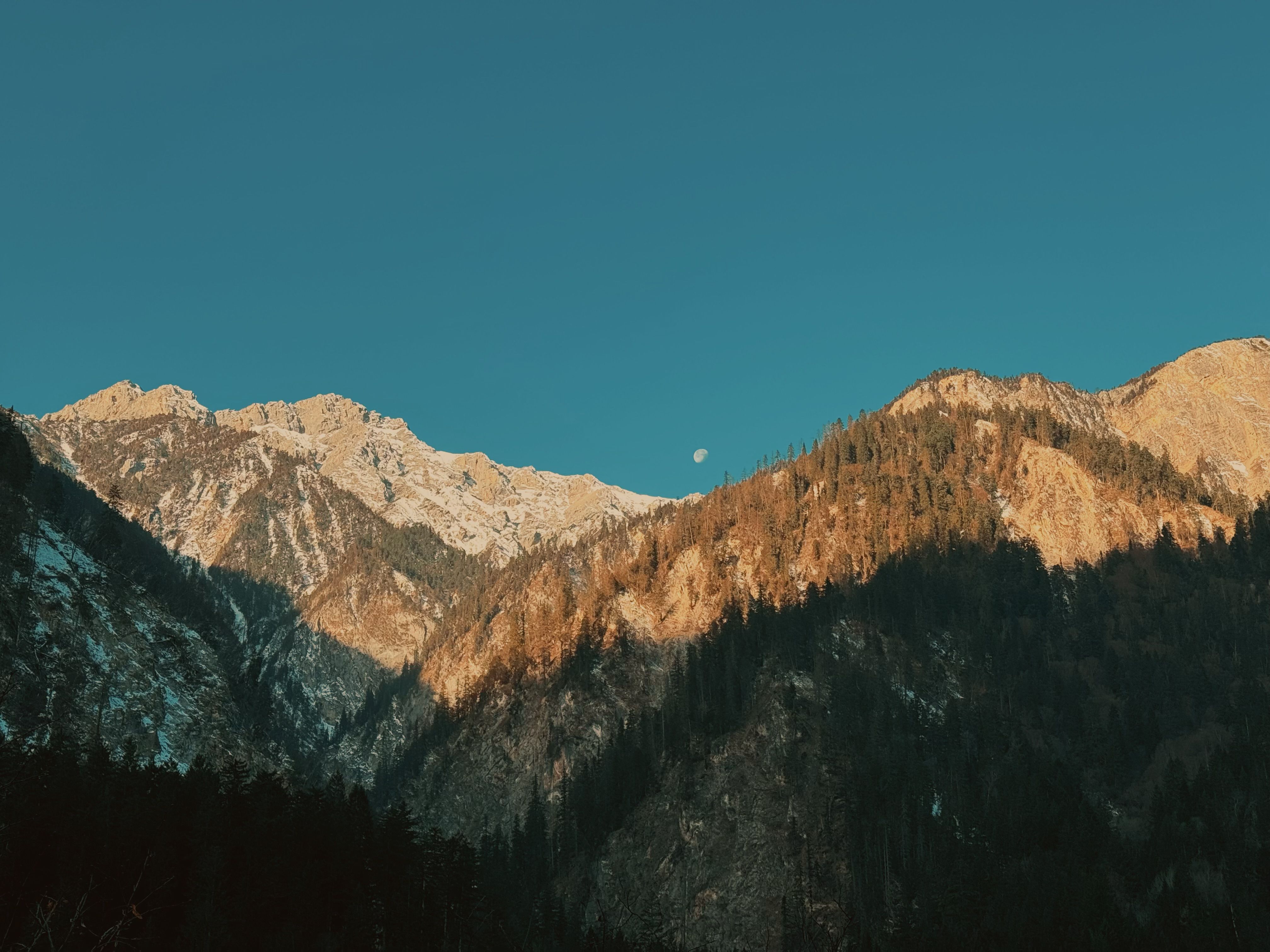 Scenic Mountain Landscape with Moon at Sunset · Free Stock Photo