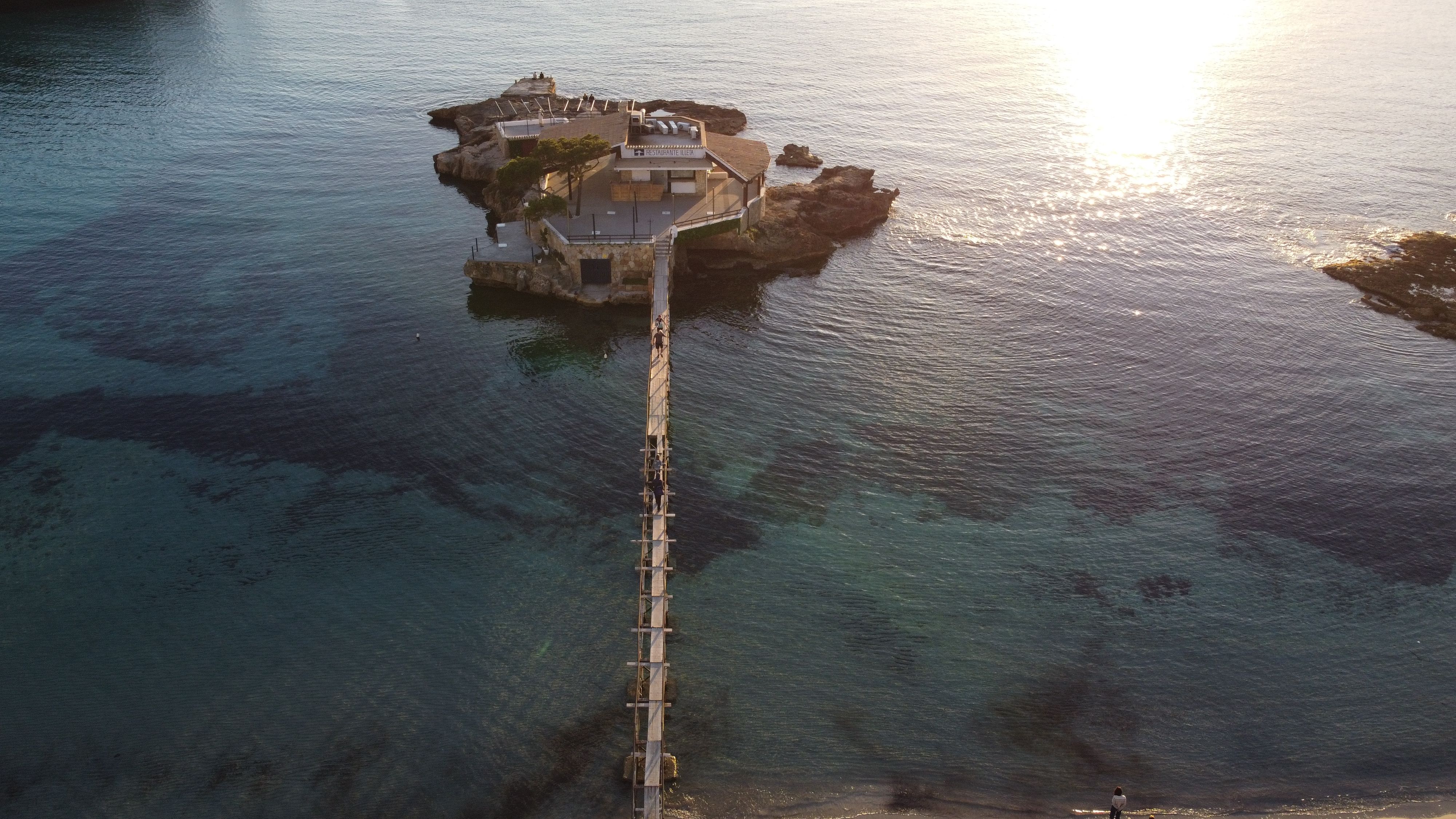 Scenic Island with Walkway at Sunset · Free Stock Photo