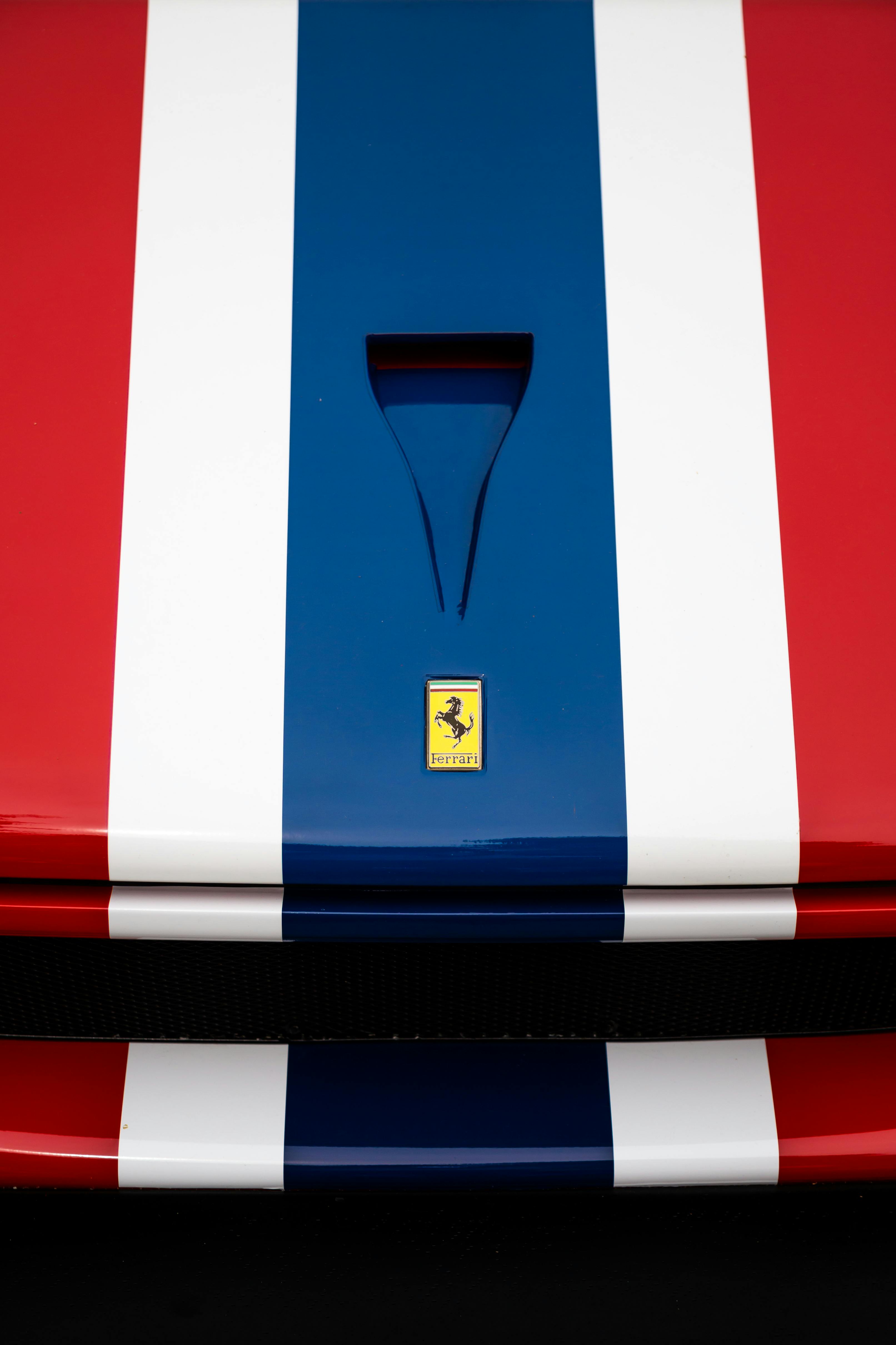 Stylish Ferrari Hood with Racing Stripes · Free Stock Photo