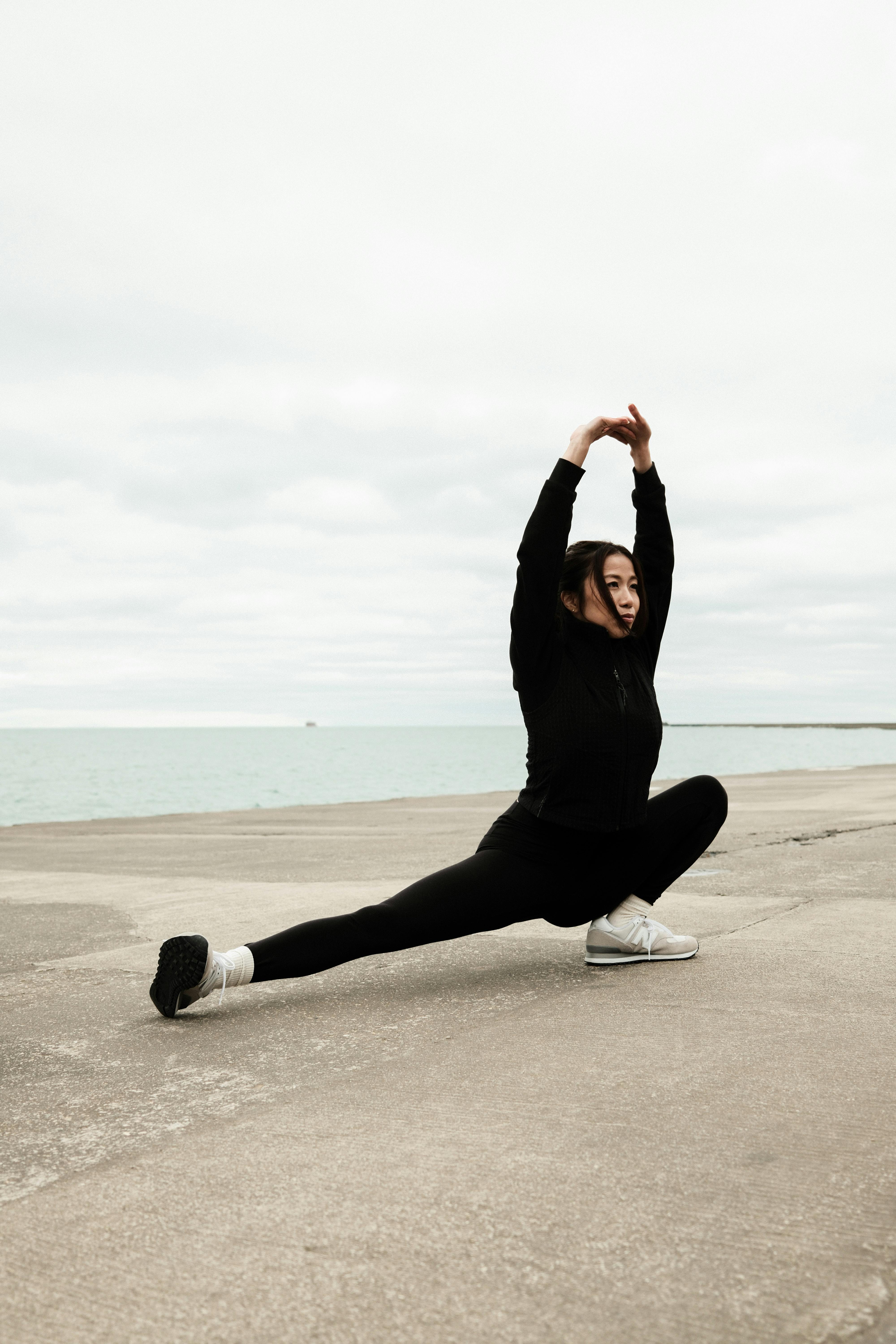 Outdoor Stretching Exercise by the Lake · Free Stock Photo