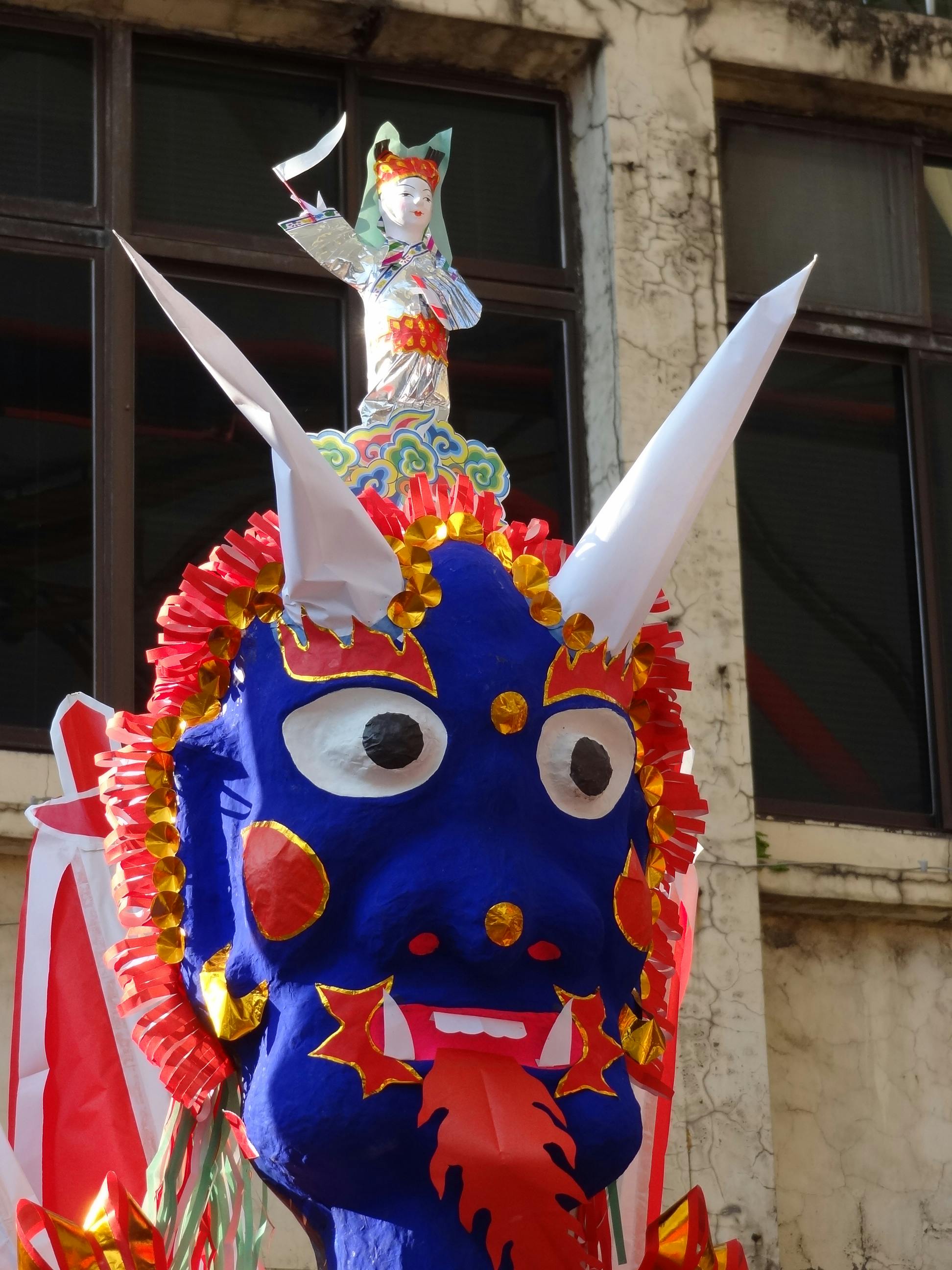 Colorful Dragon Parade Puppet with Intricate Design · Free Stock Photo