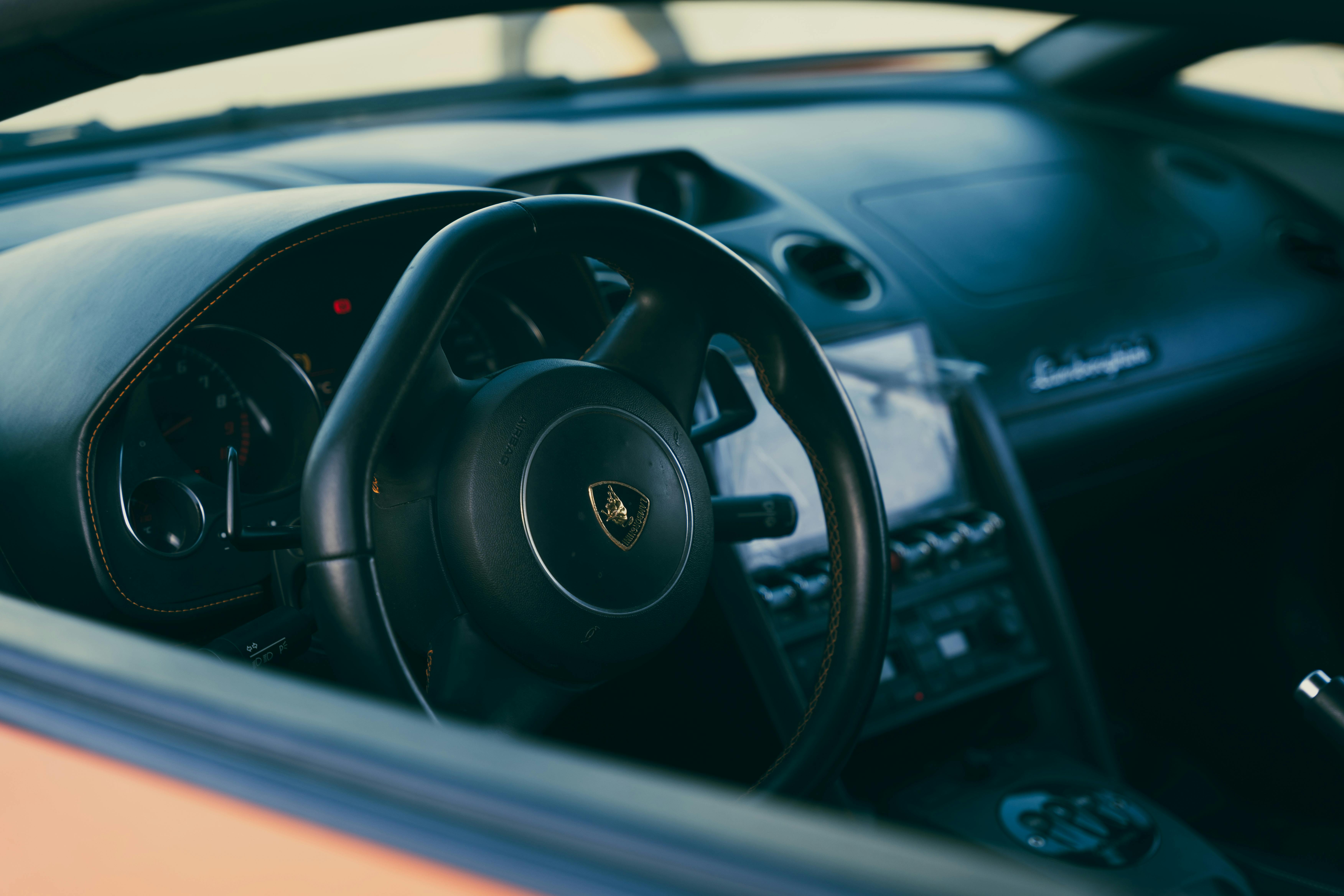 Luxury Lamborghini Steering Wheel Close-Up · Free Stock Photo