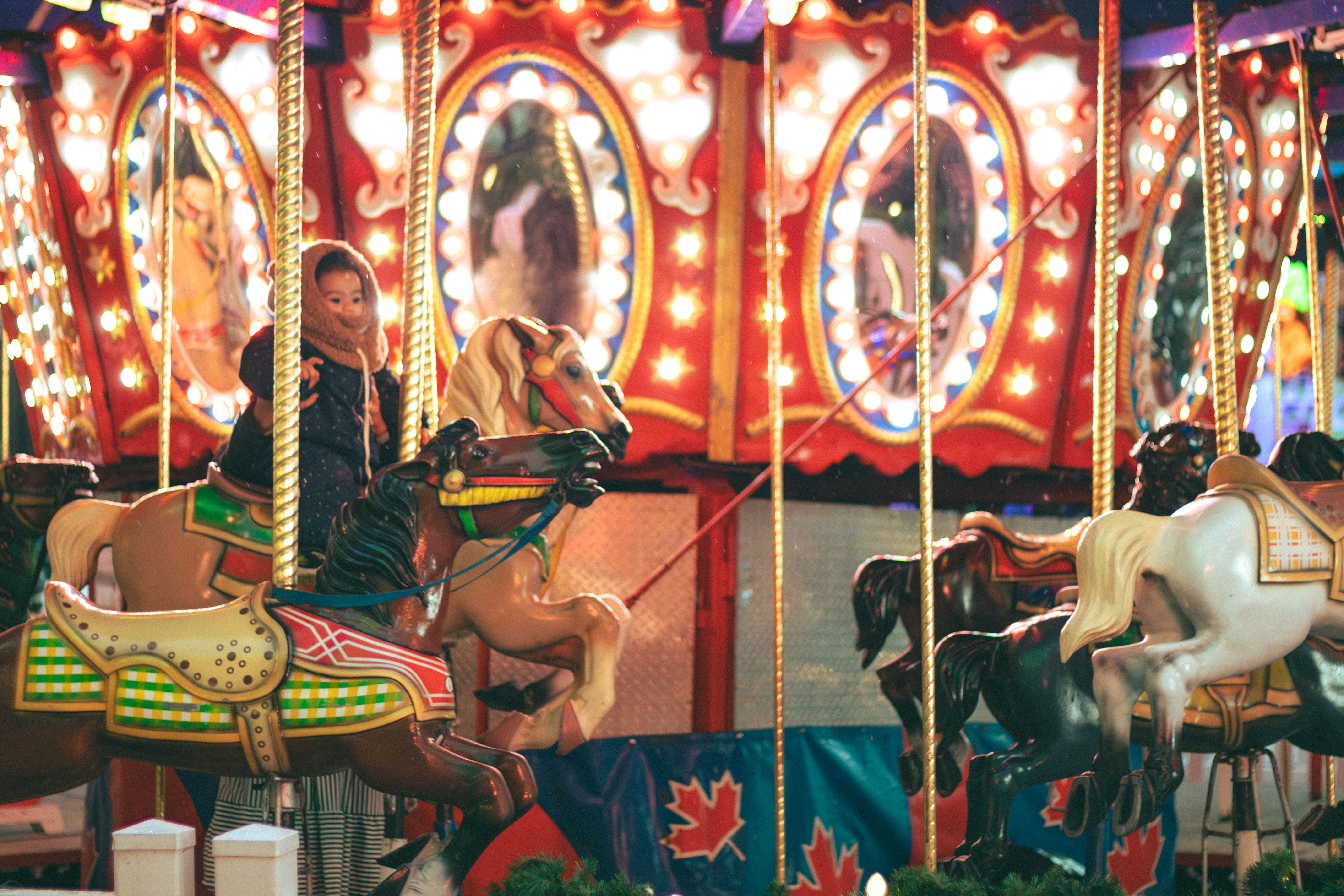 Festive Carousel Ride in Toronto at Night · Free Stock Photo