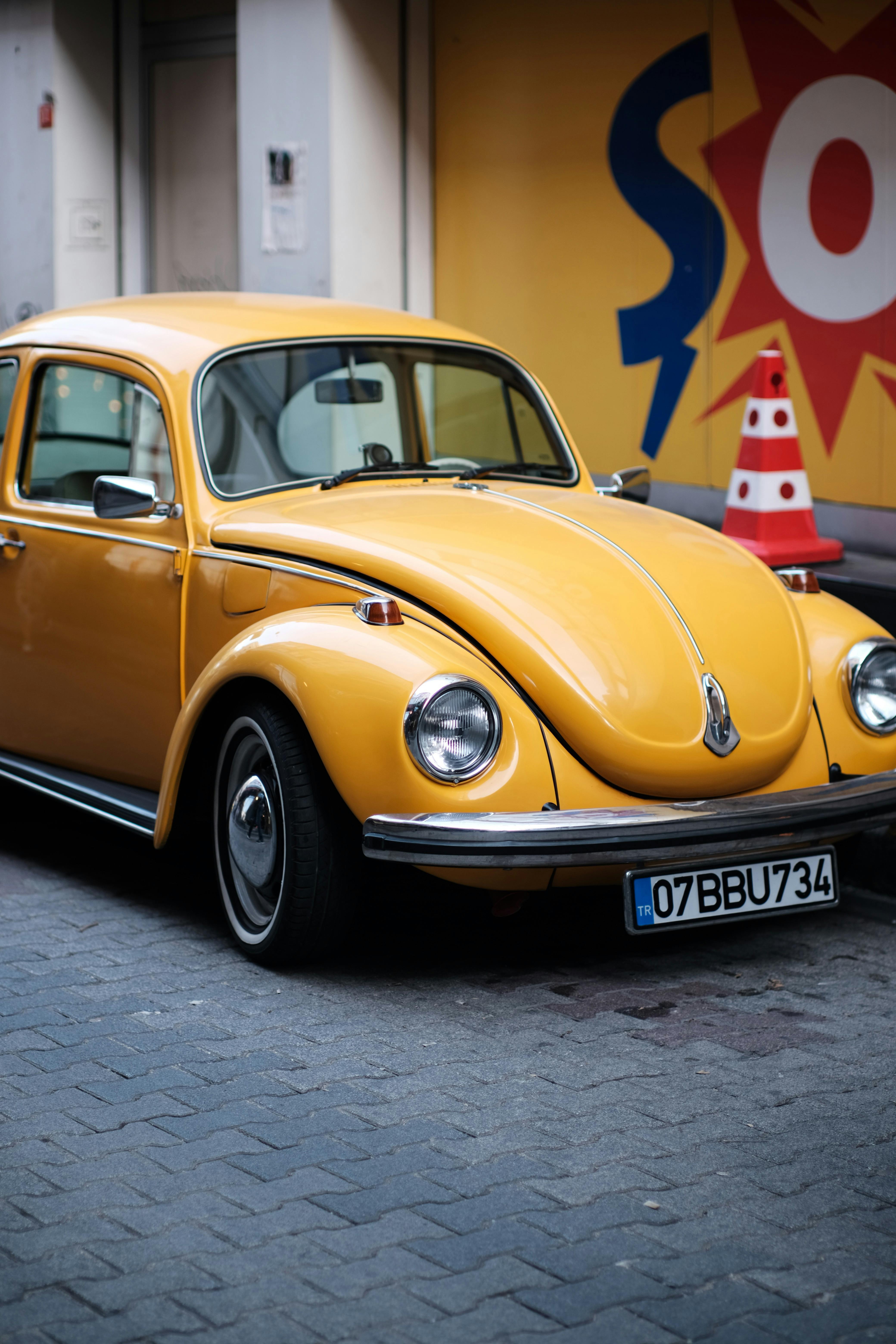 Classic Yellow Beetle Car Parked on Street · Free Stock Photo