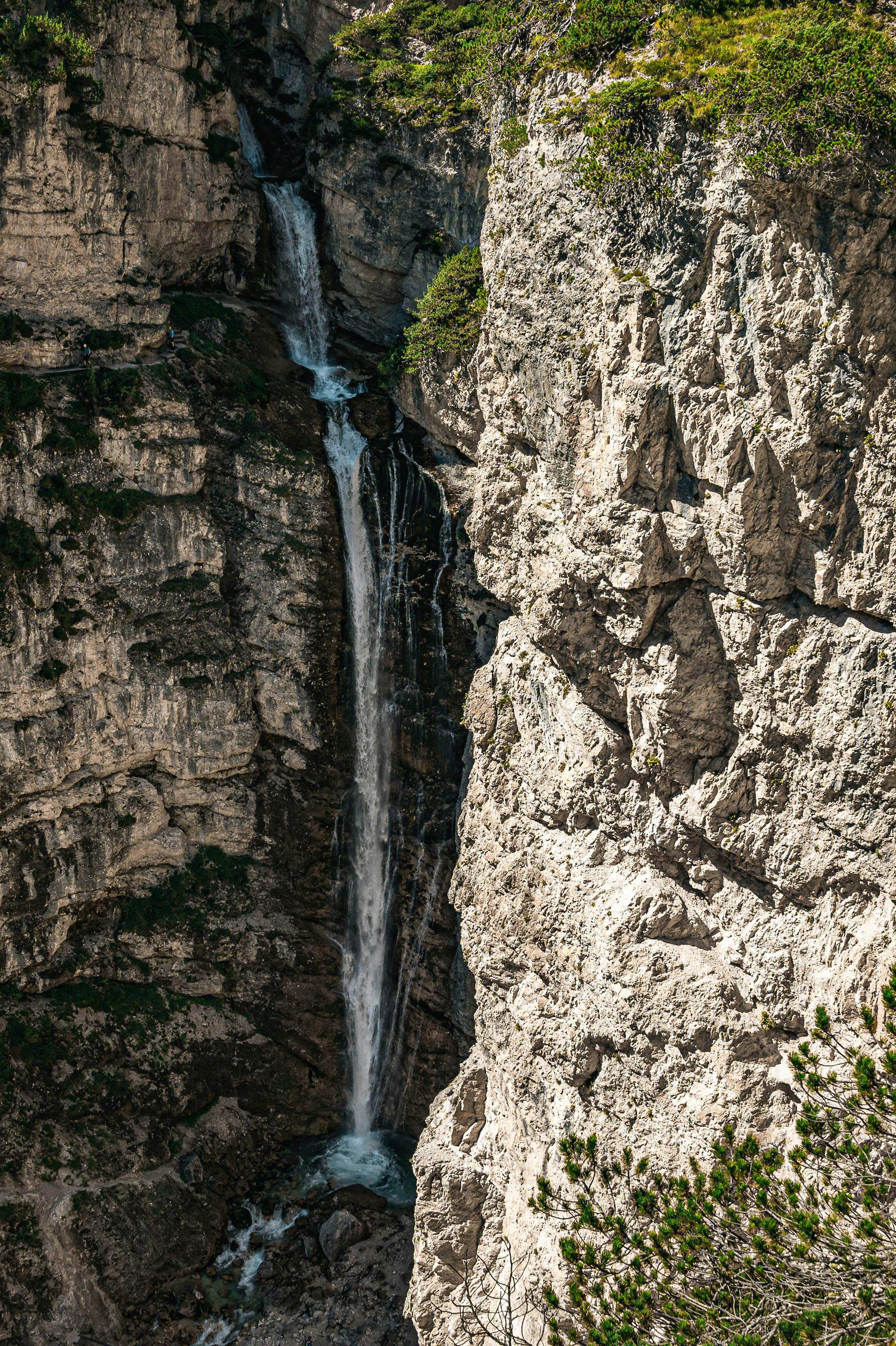 Photo of Waterfalls on Rock Cliff · Free Stock Photo